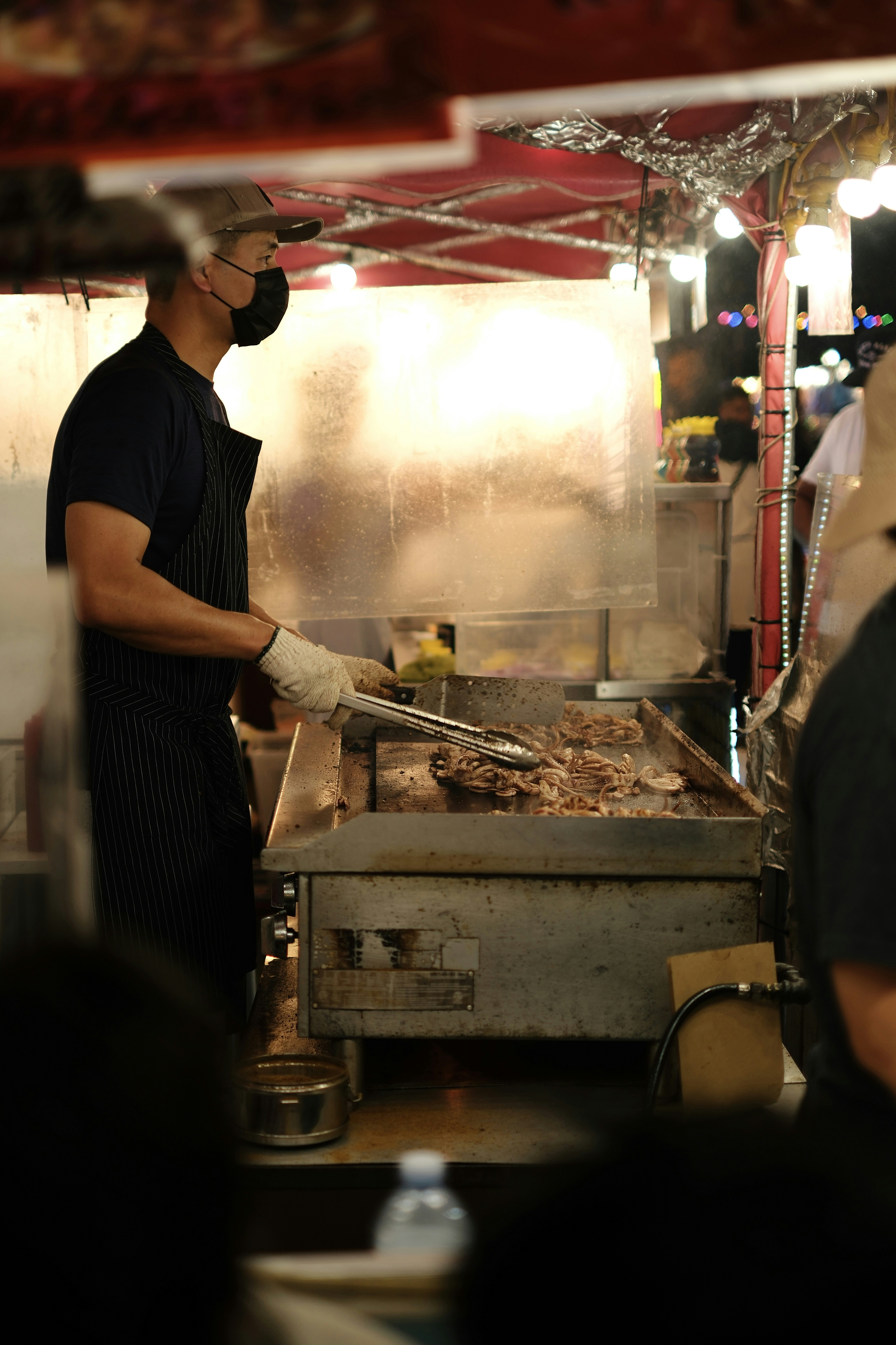 Culinary Craftsmanship Under Neon Lights