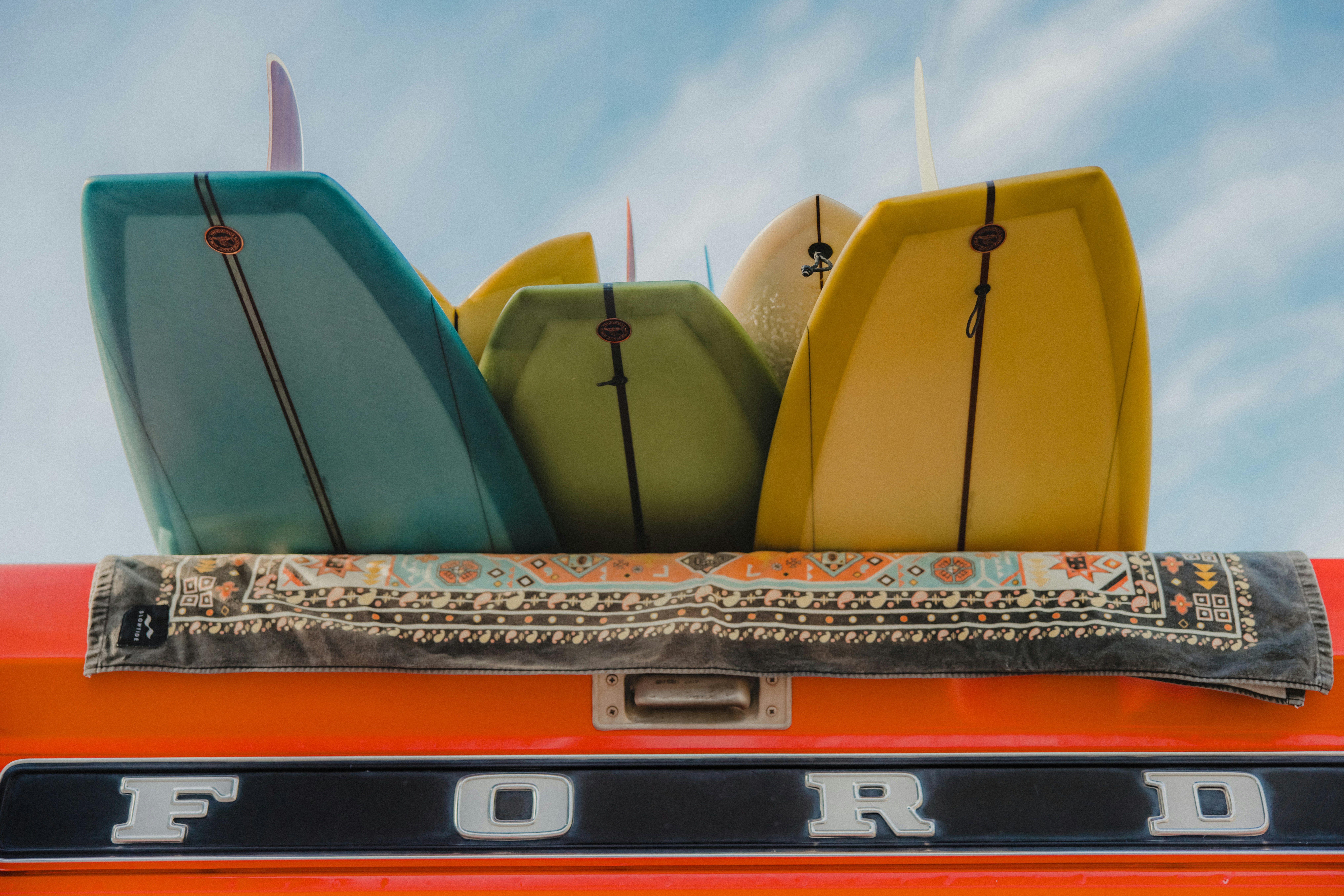 Surfboards in Harmony atop a Vintage Ford