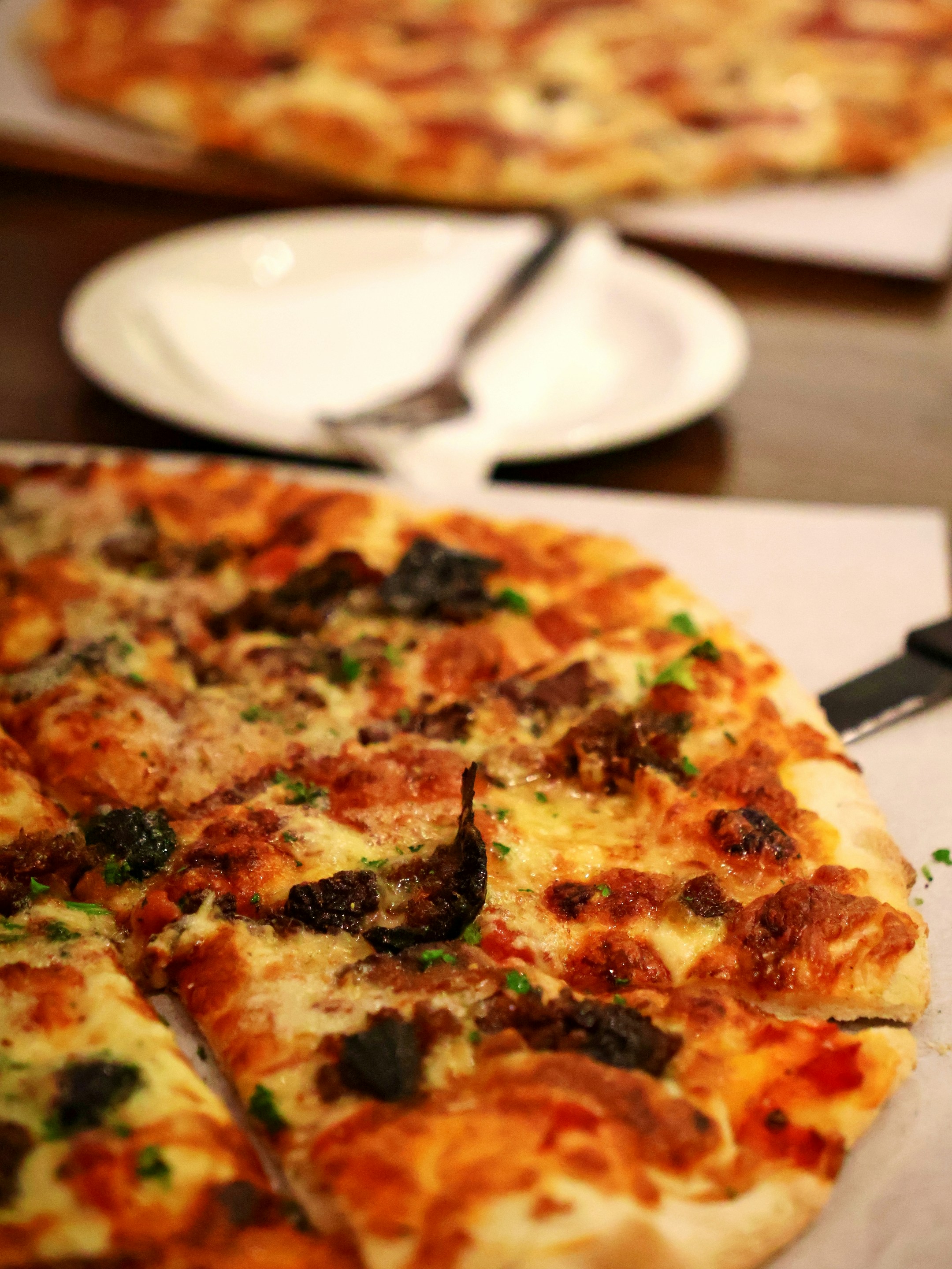Biltong & Blue Cheese Pizza | Two delicious pizzas on a table