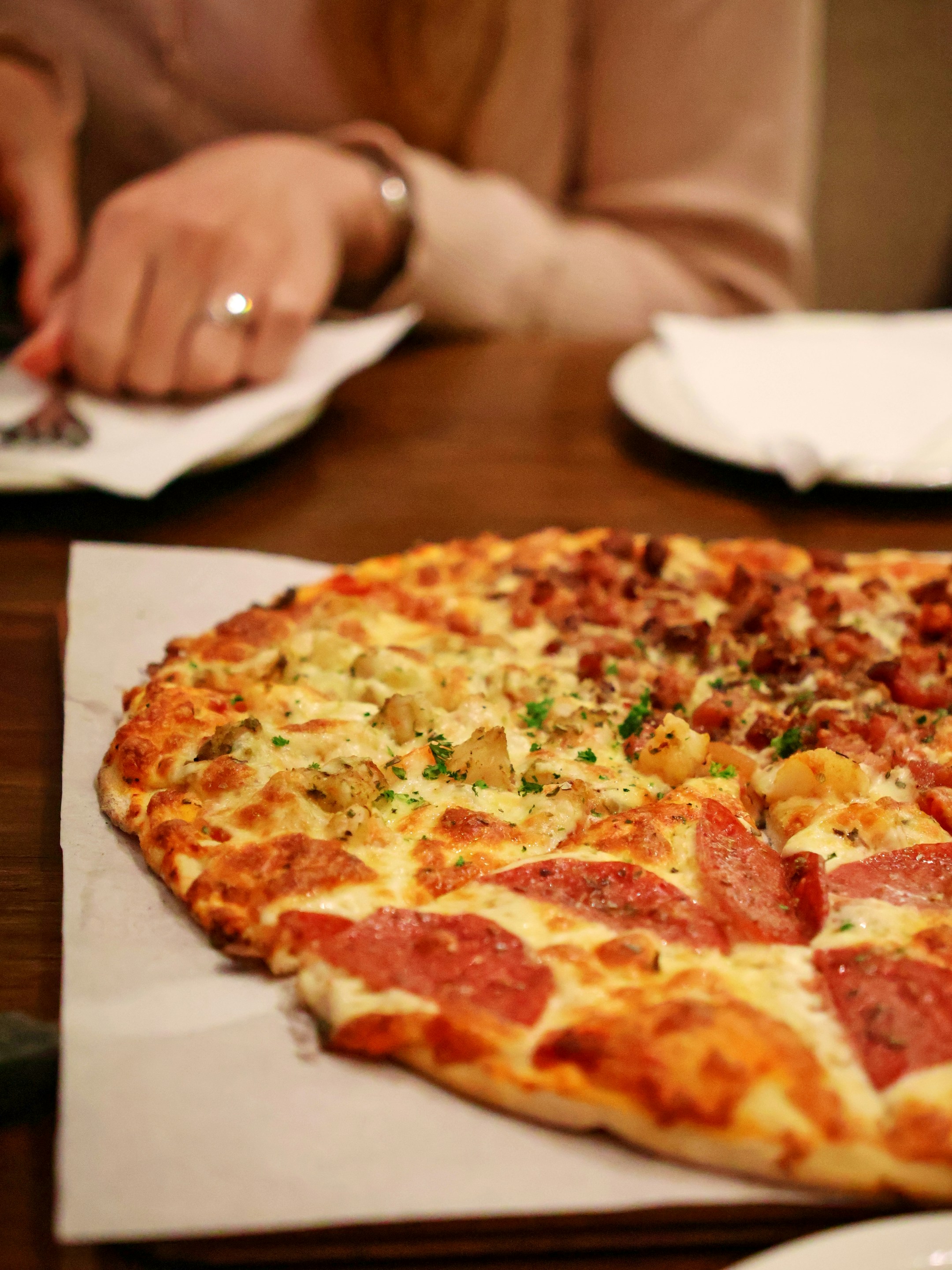 Savoring a Slice: Culinary Delight on a Shared Table