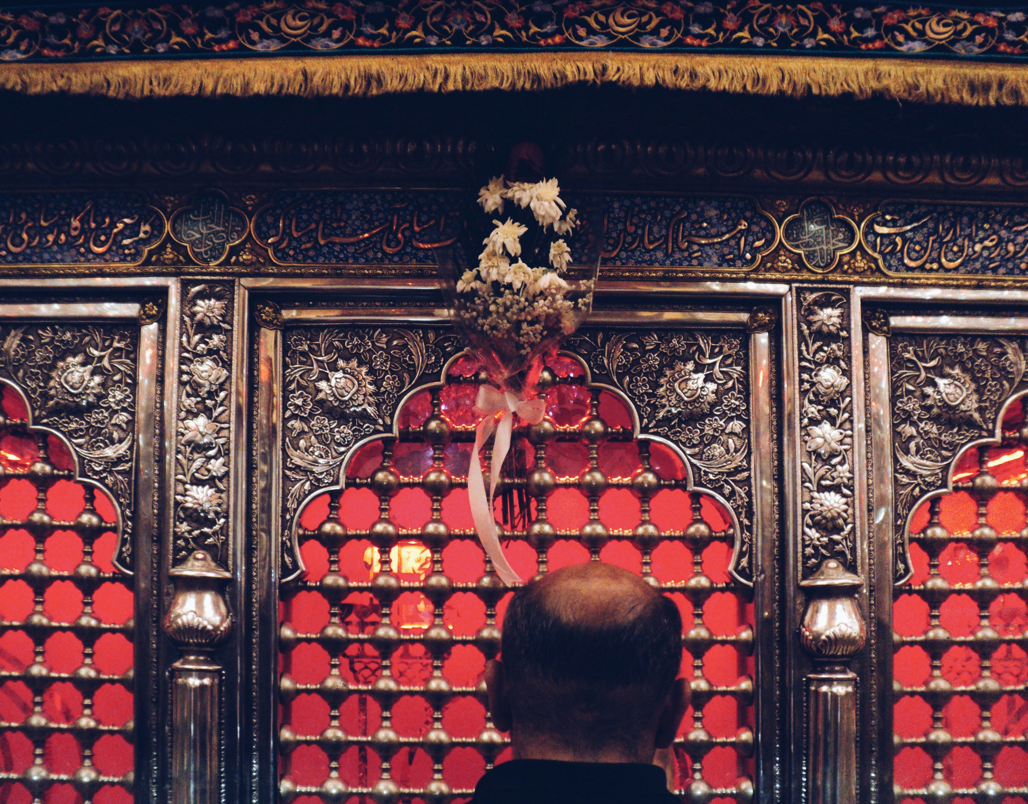 A Moment of Reverence at the Ornate Shrine