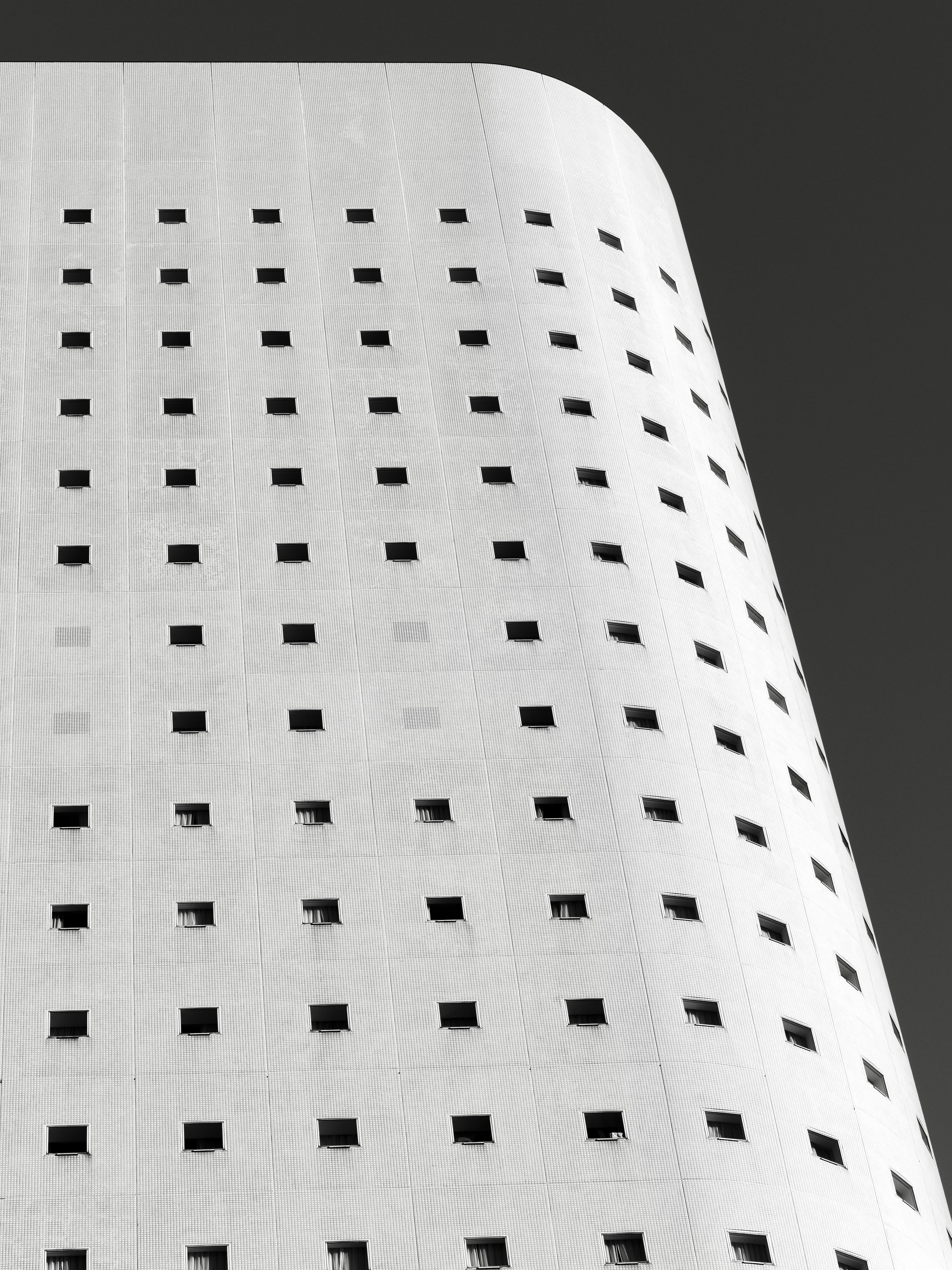 Tiny Windows | White surface with a grid of small black dots
