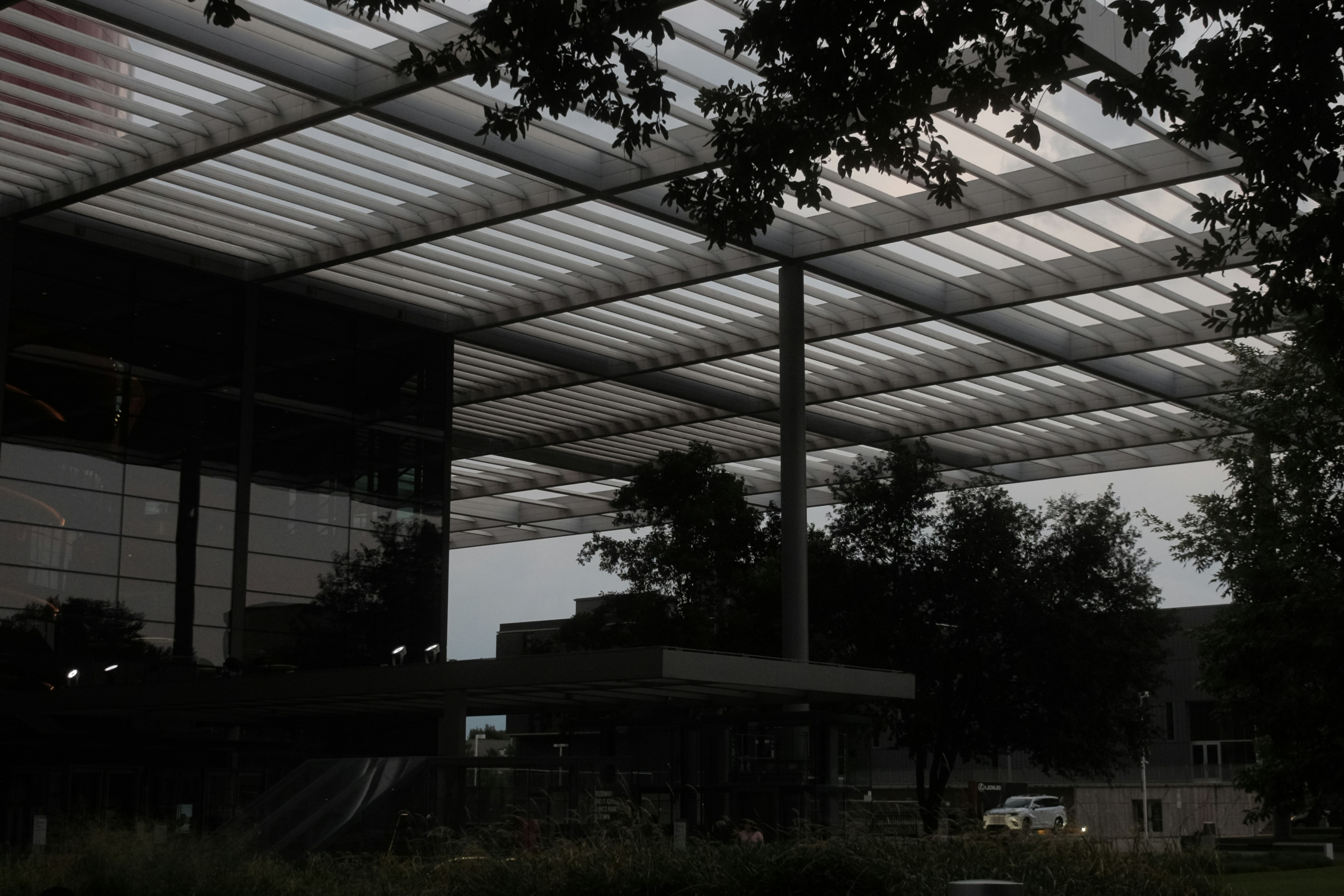 Modern building with a large, sloped roof. photo – Free Texture Image ...