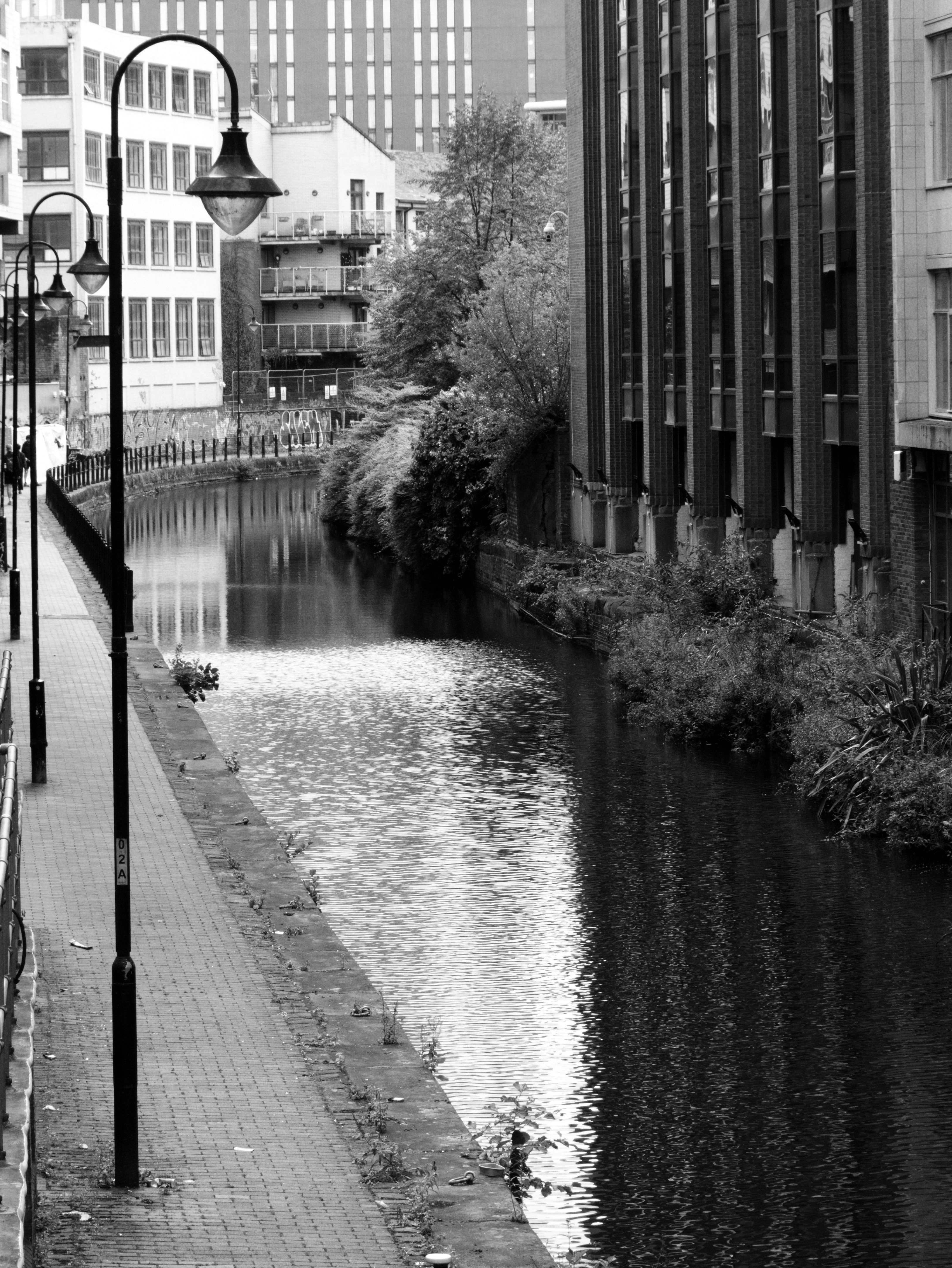 Canal waterway with buildings and lamp post