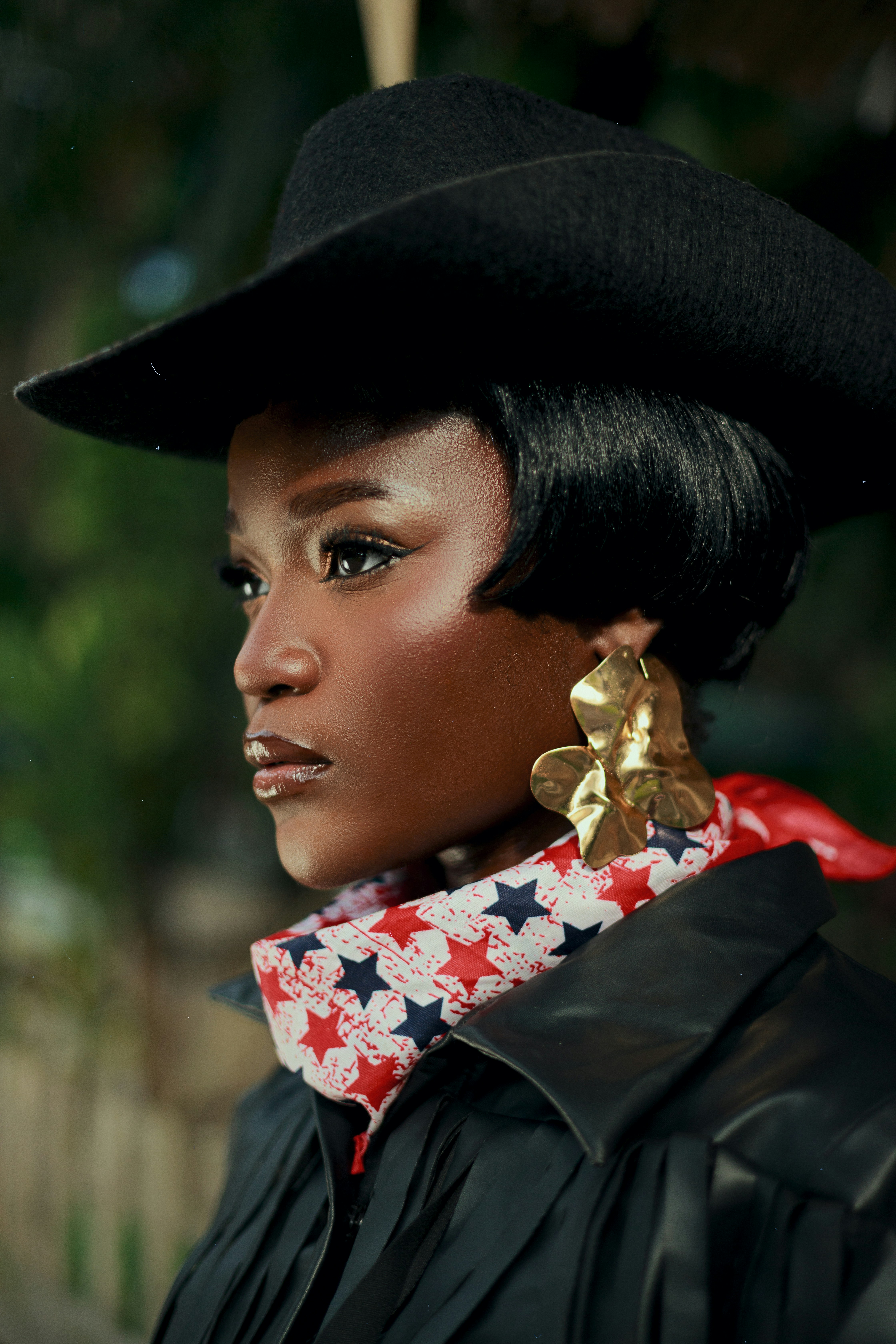 Portrait in a Wide-brim Moment: Bold Black Hat and Red-White Stars