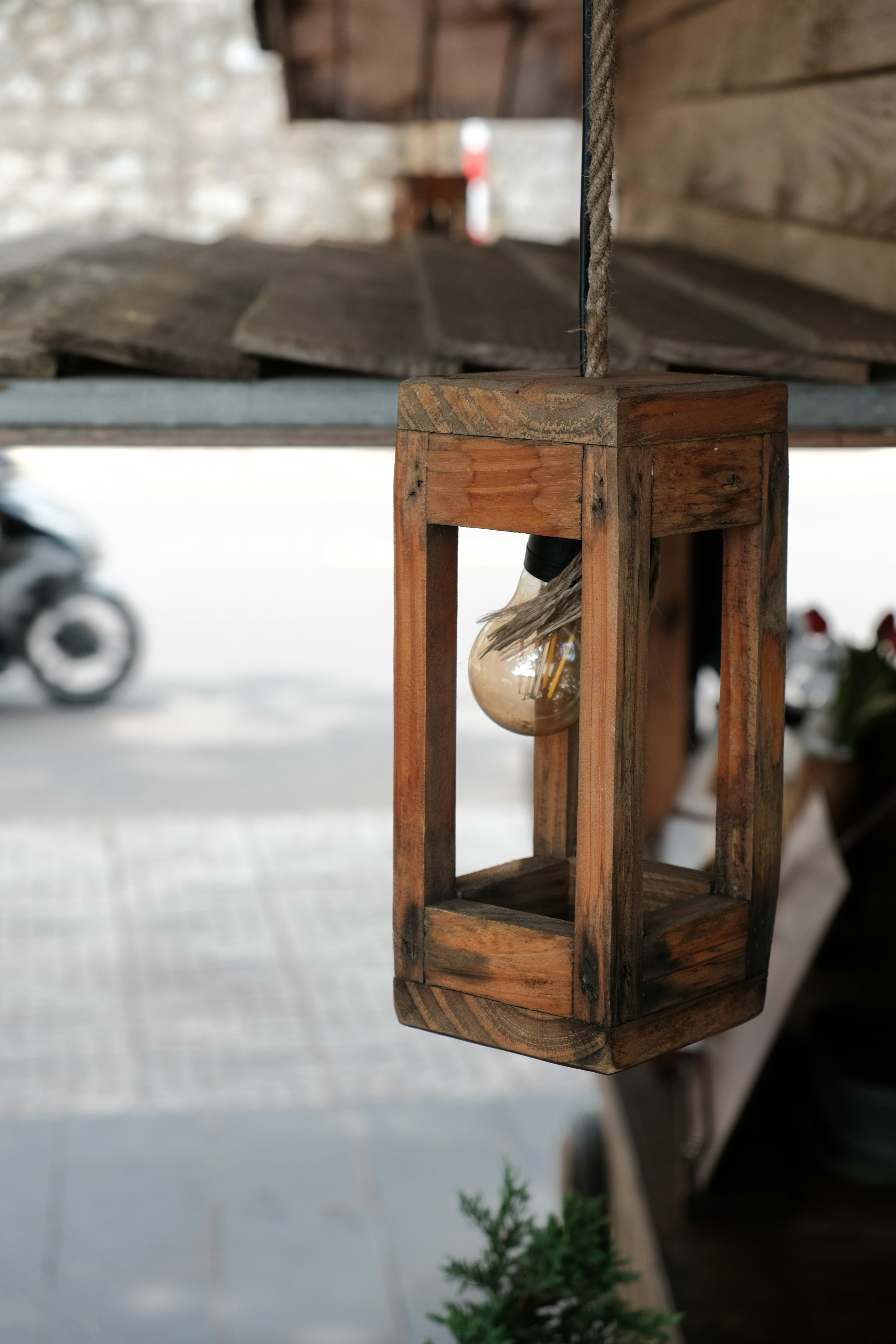 Rustic Lantern Underneath a Wooden Beam