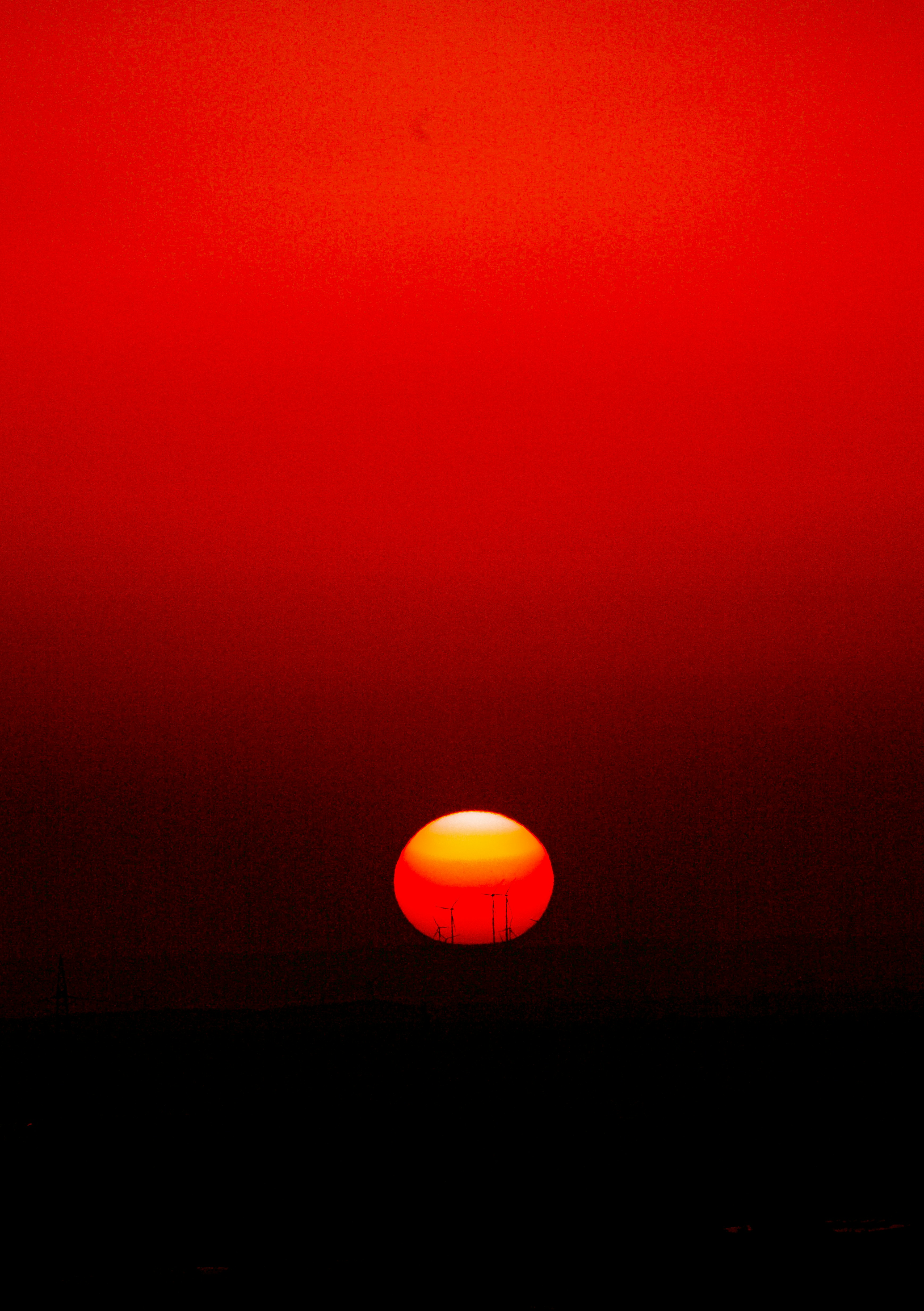 Crimson Horizon: The Sun's Descent