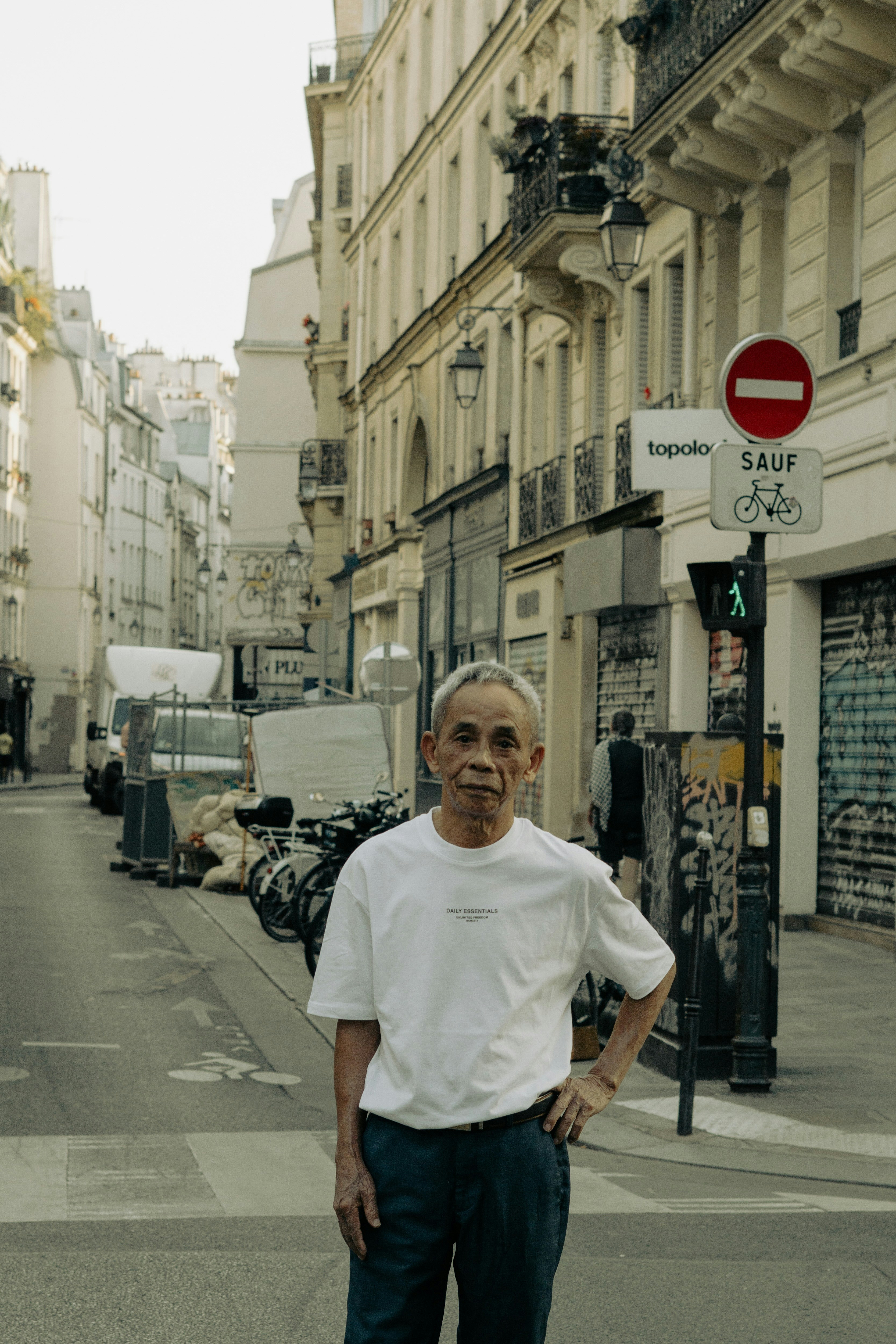 Man standing on a street in paris