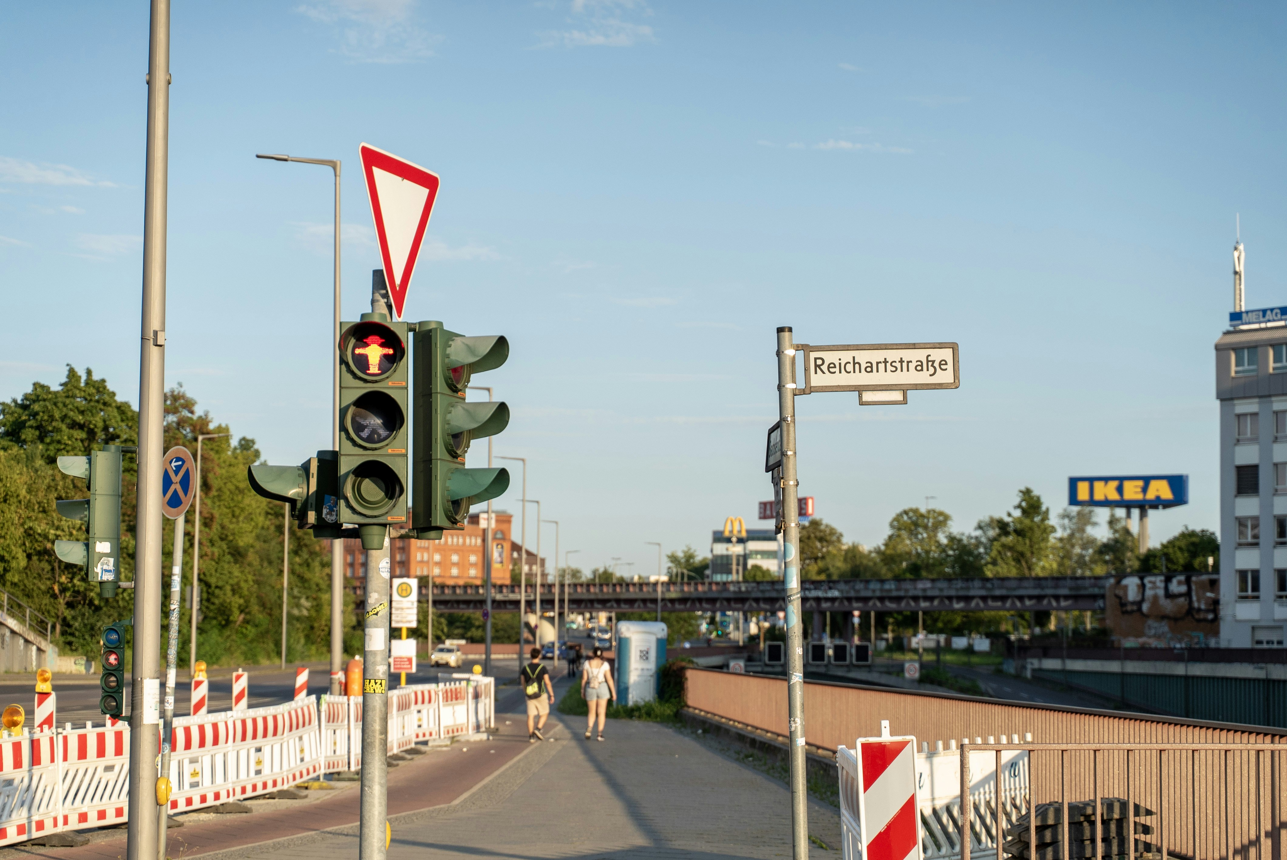 Traffic light on a street with buildings and buildings