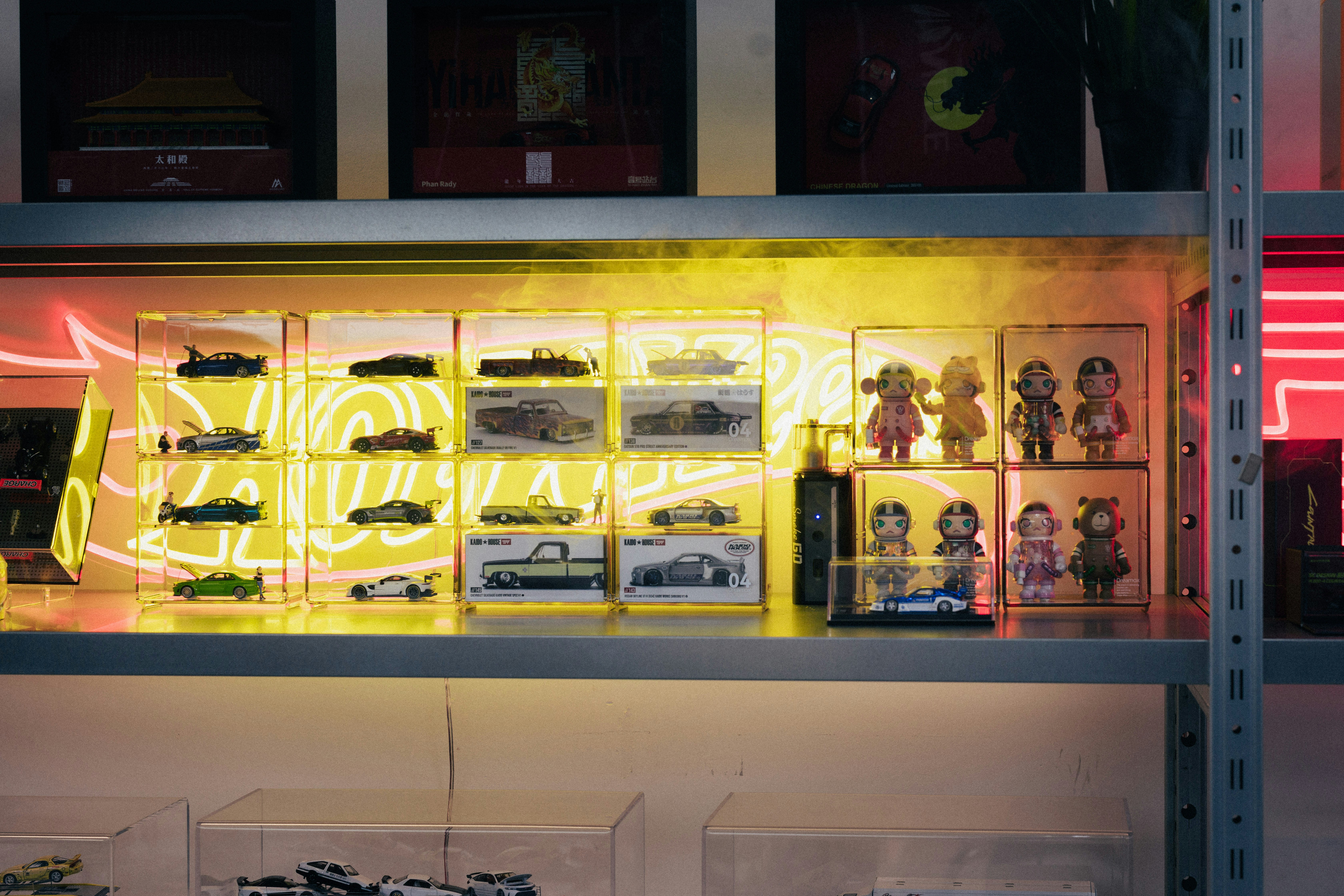 Car event meeting at RC Cambodia | Modern storefront display with illuminated products
