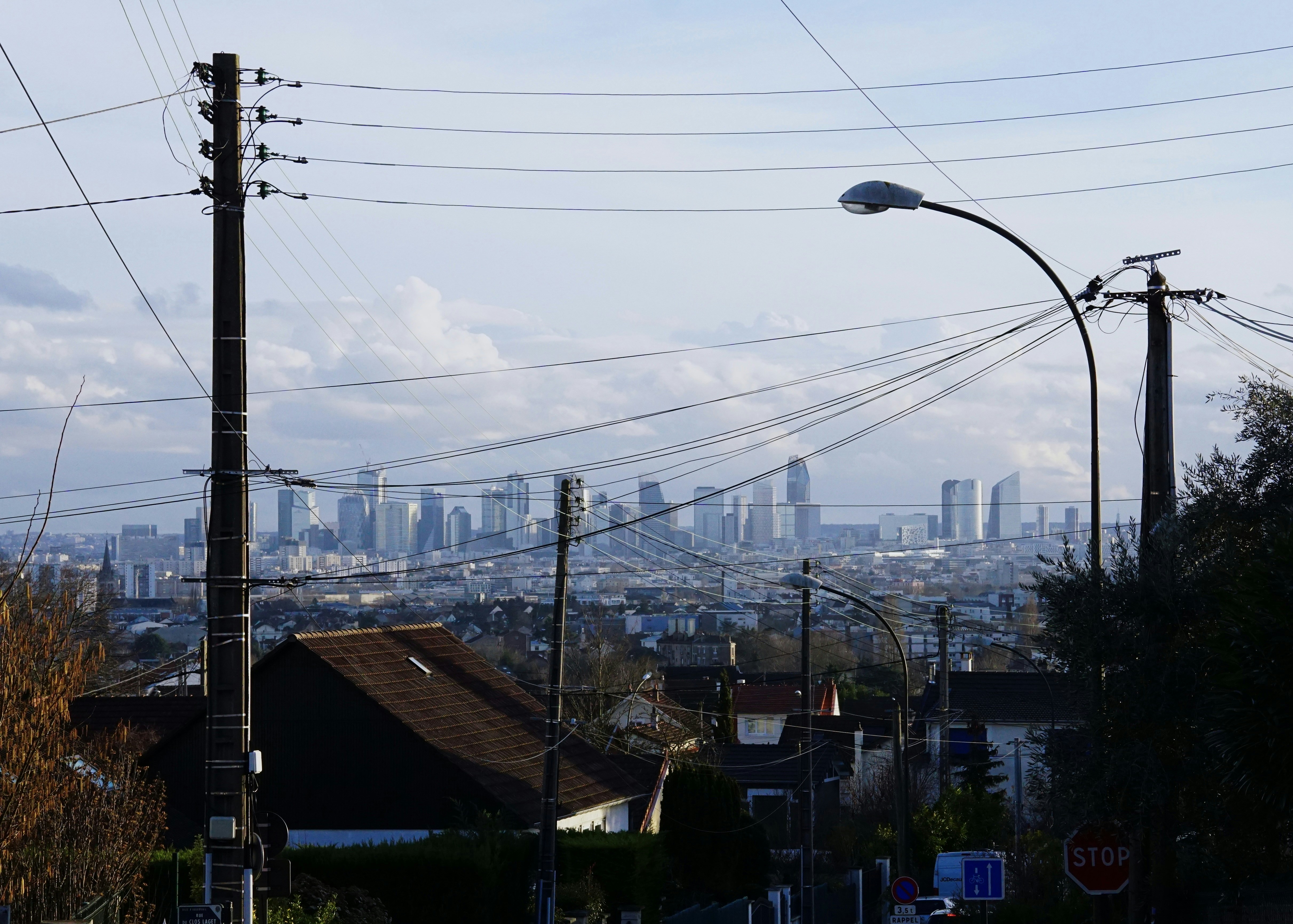 City skyline with power lines and streetlights photo – Free Japan Image ...