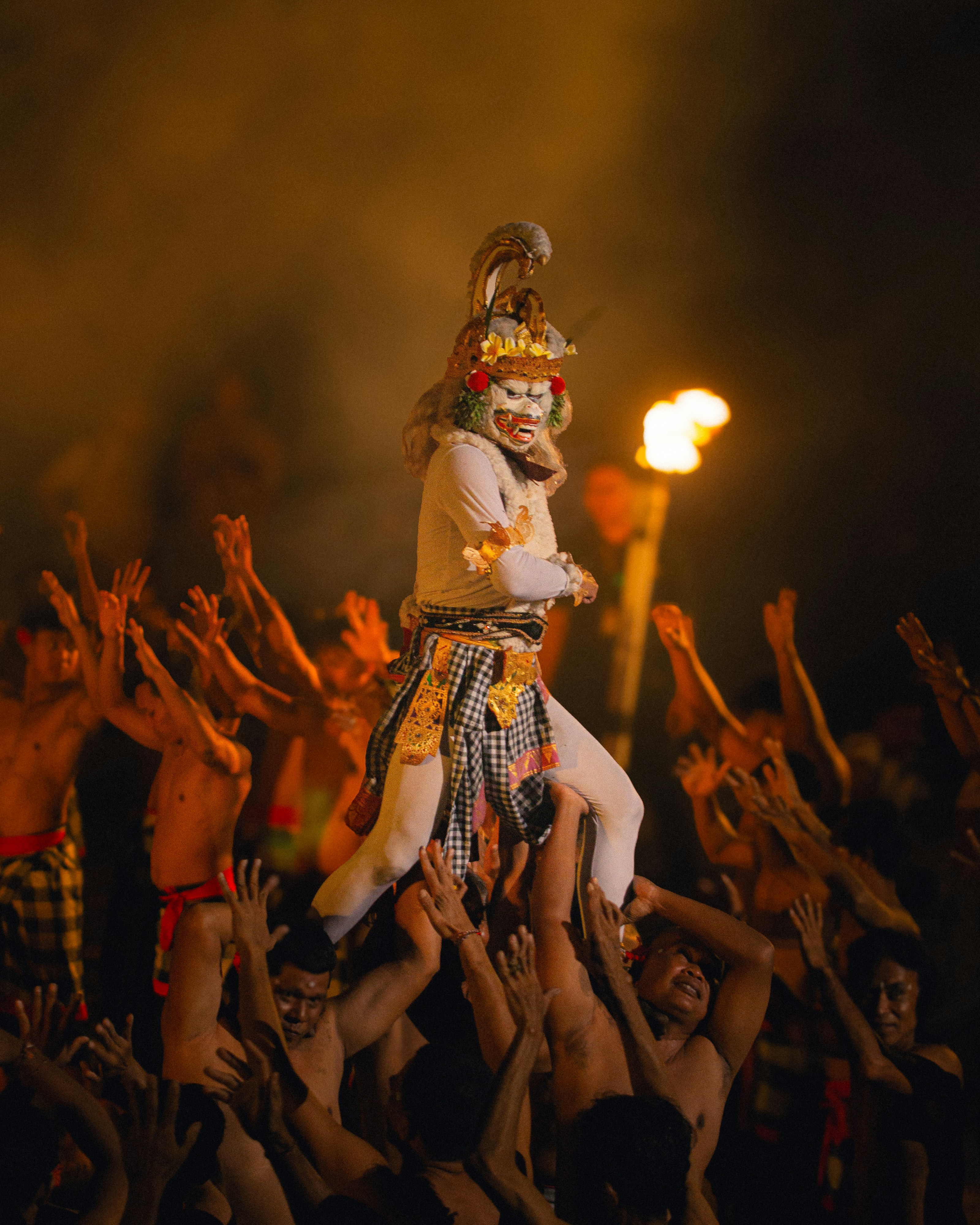 Dancer in elaborate mask carried by performers at night. photo – Free ...