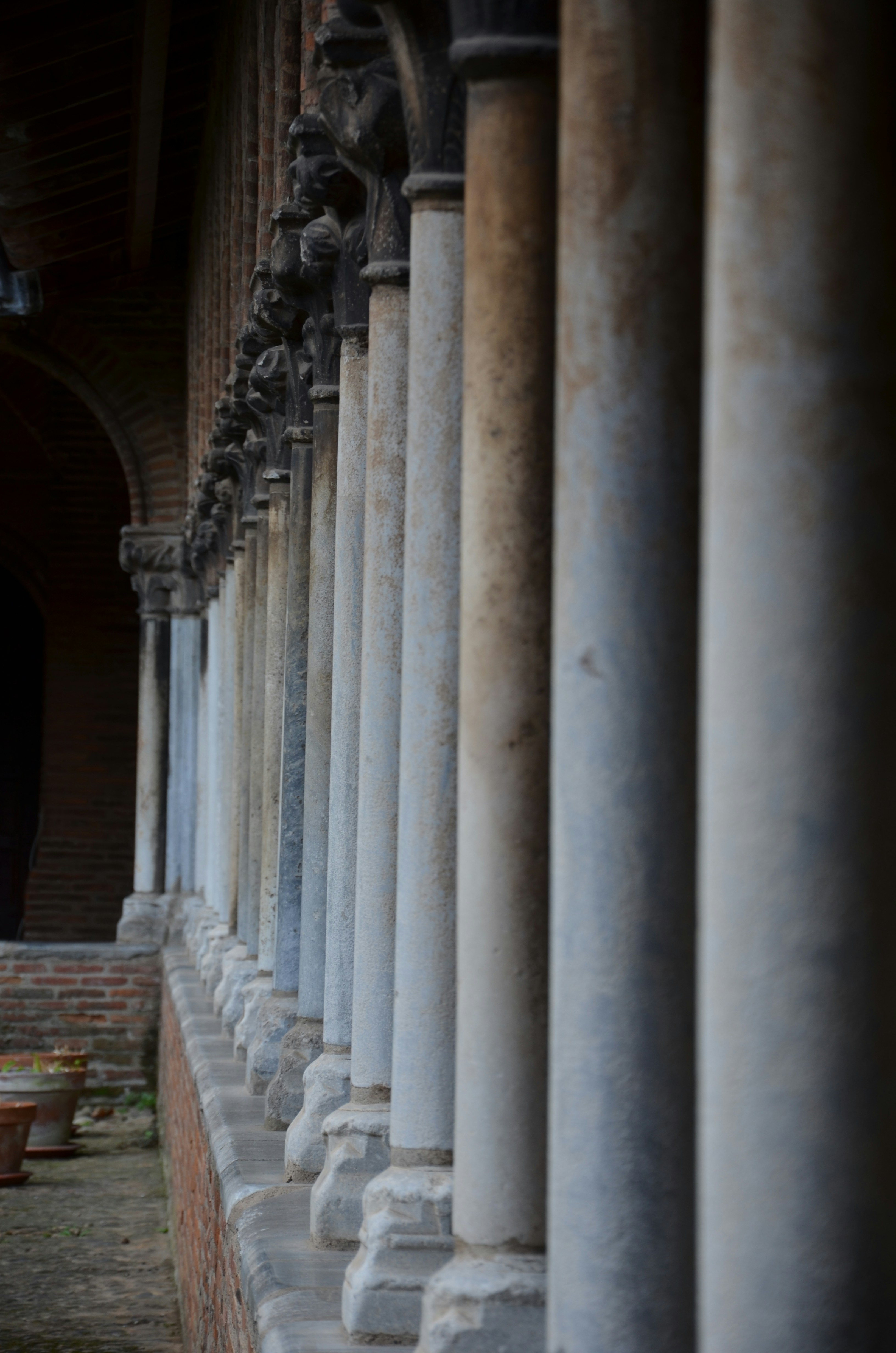 Row of stone columns in an old building