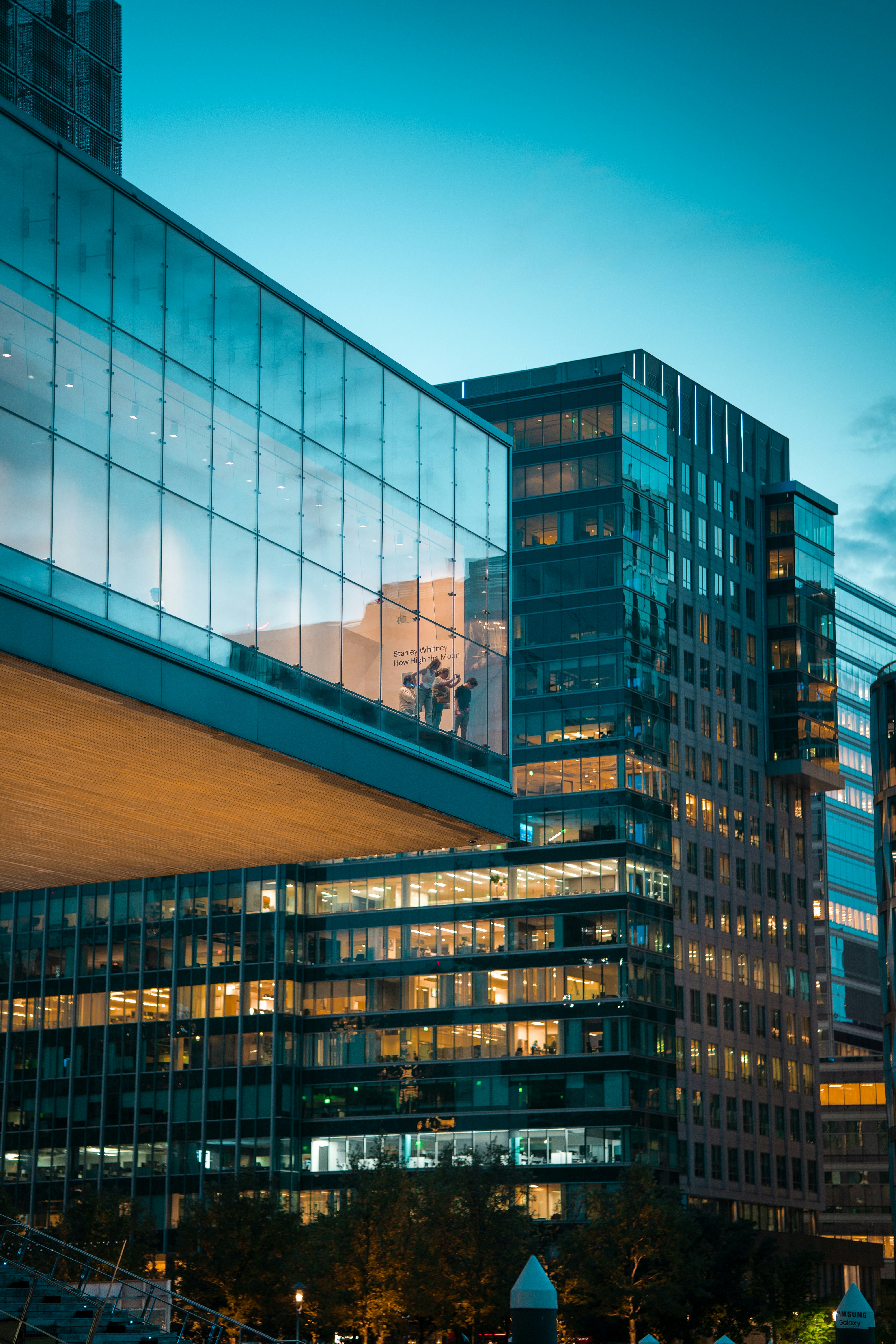 City View in North End | Modern glass buildings illuminated at dusk