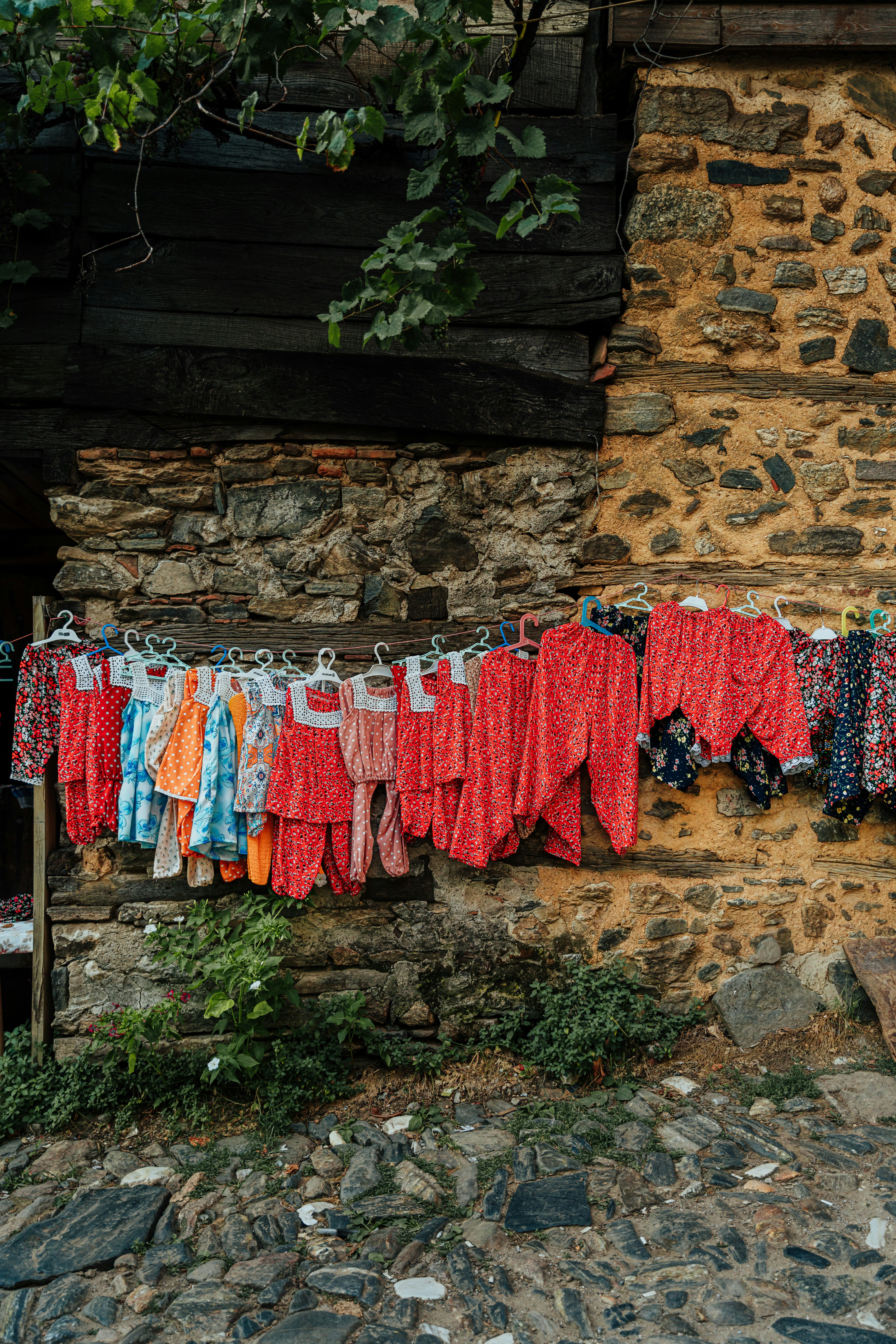 Vibrant Threads Against Rustic Backdrop