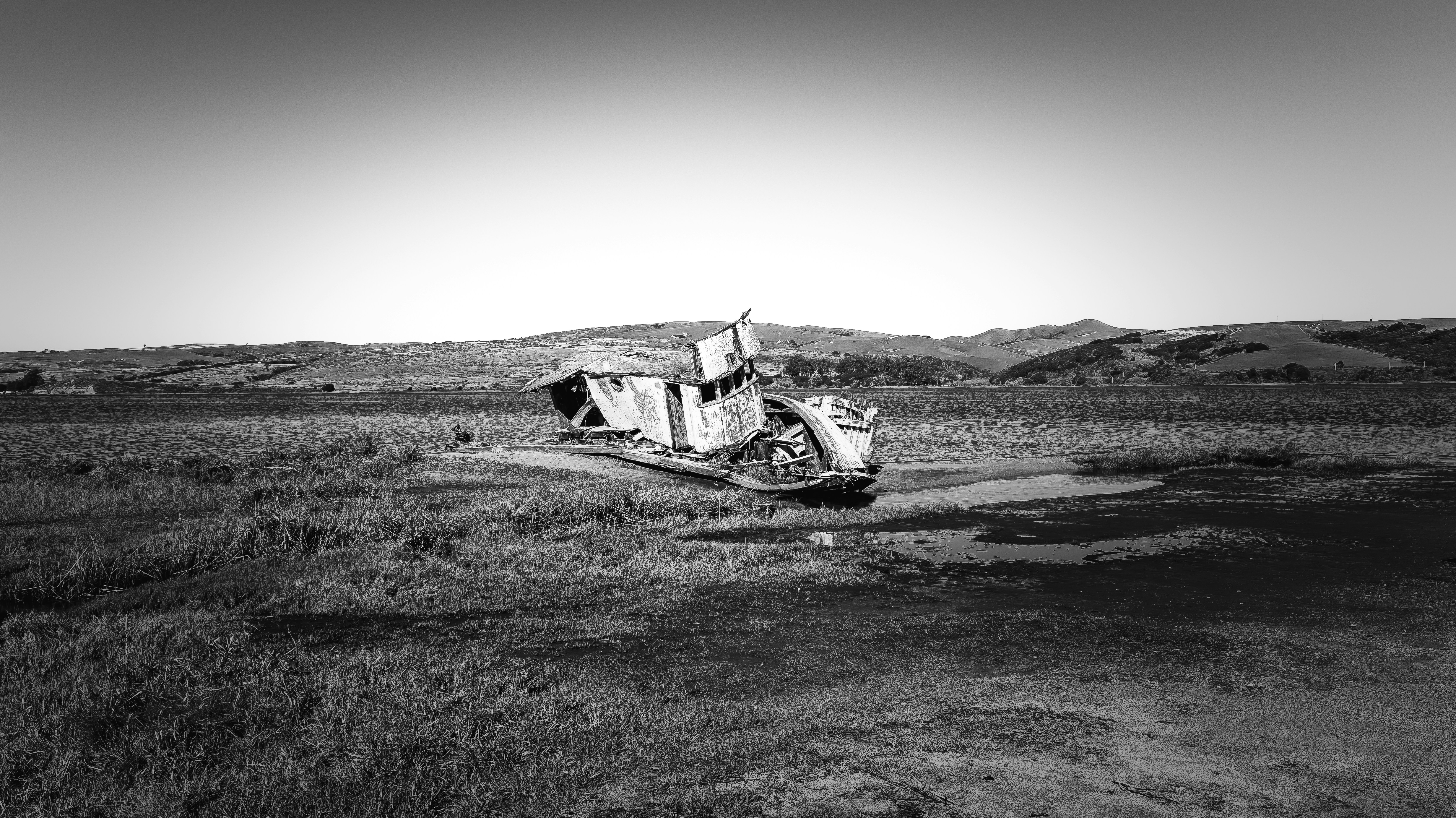 A rover exploring a barren, rocky landscape