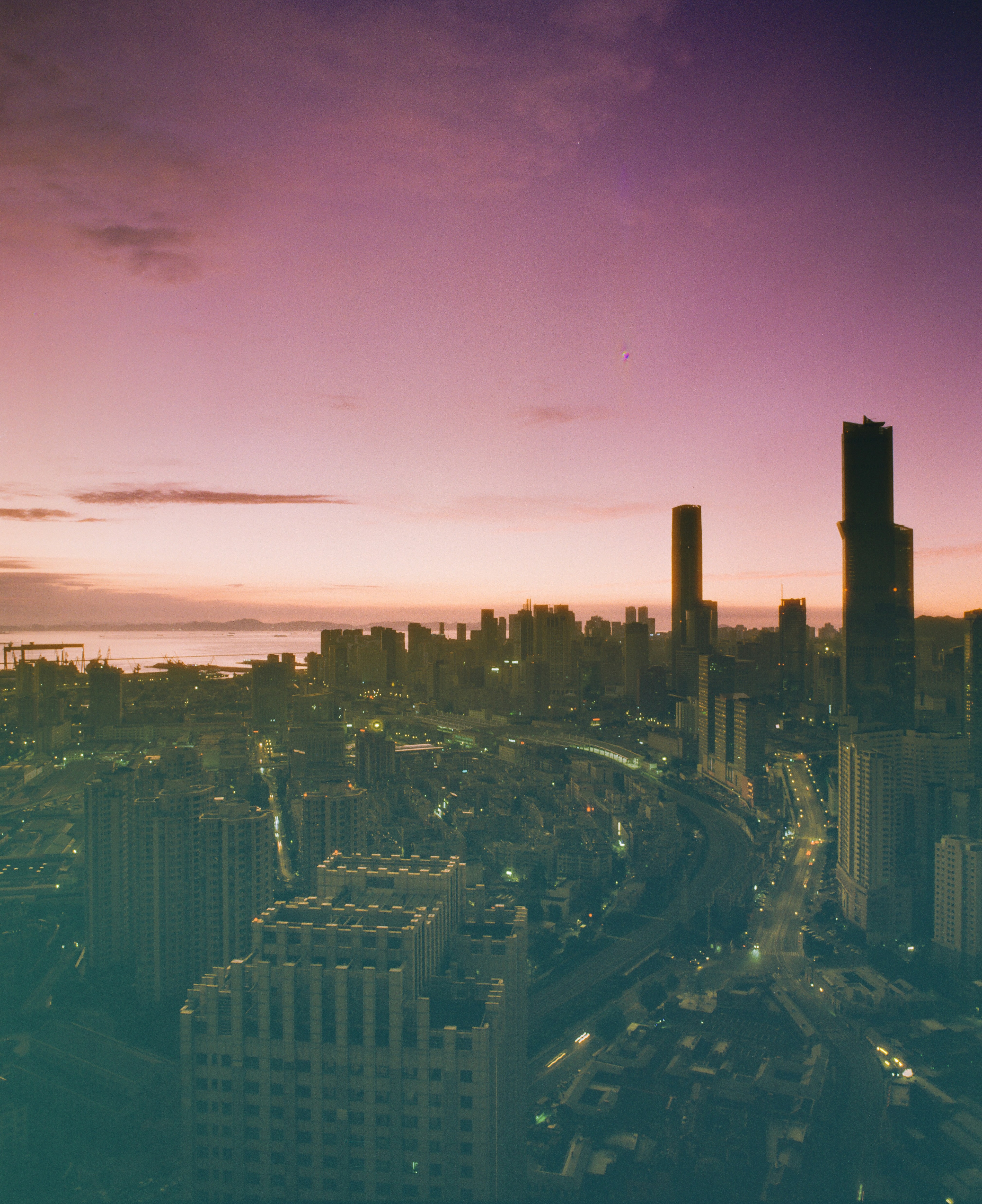 Cityscape with skyscrapers at dusk with purple sky photo – Free City ...