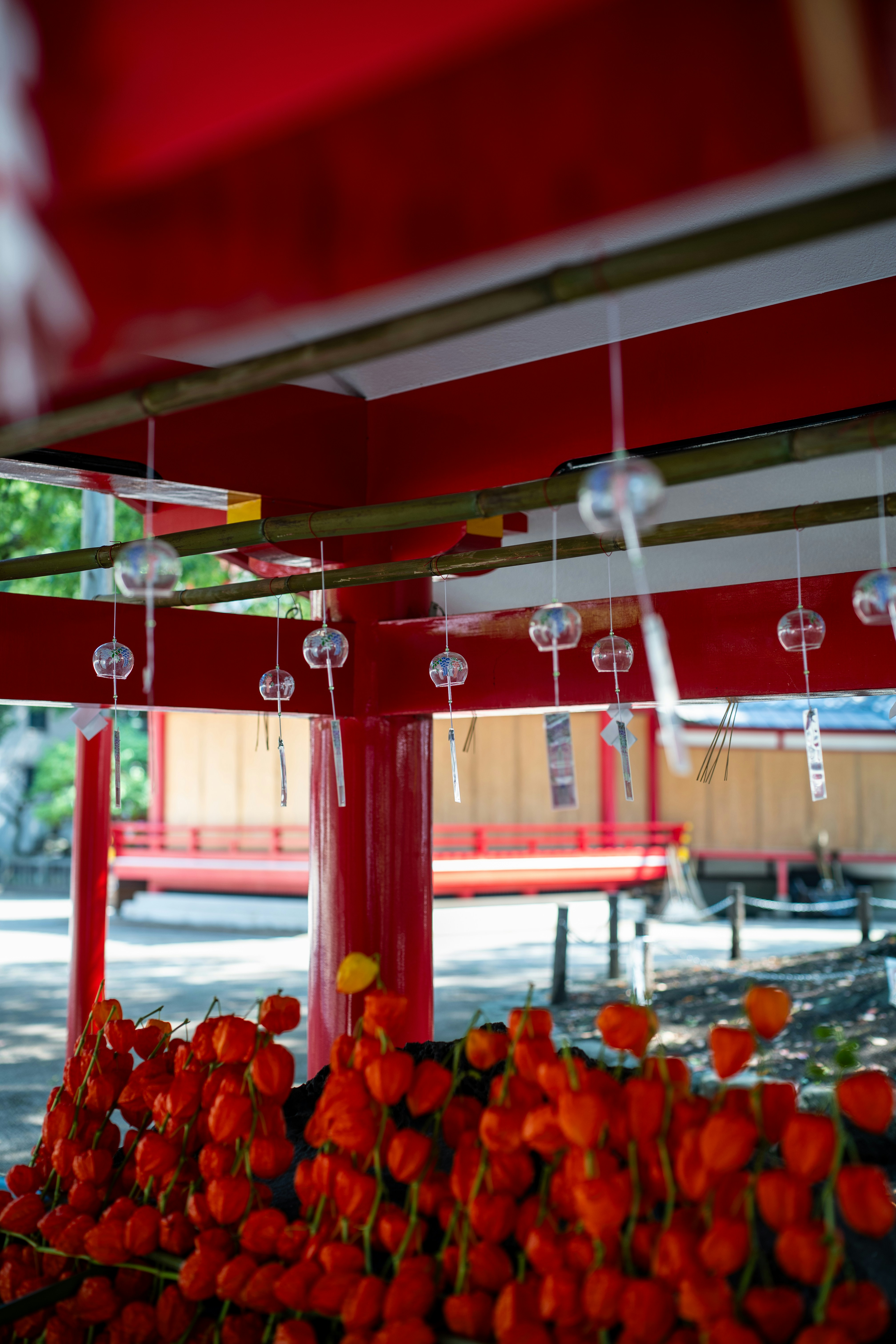 Glow of Red Pillars and Dangling Orbs