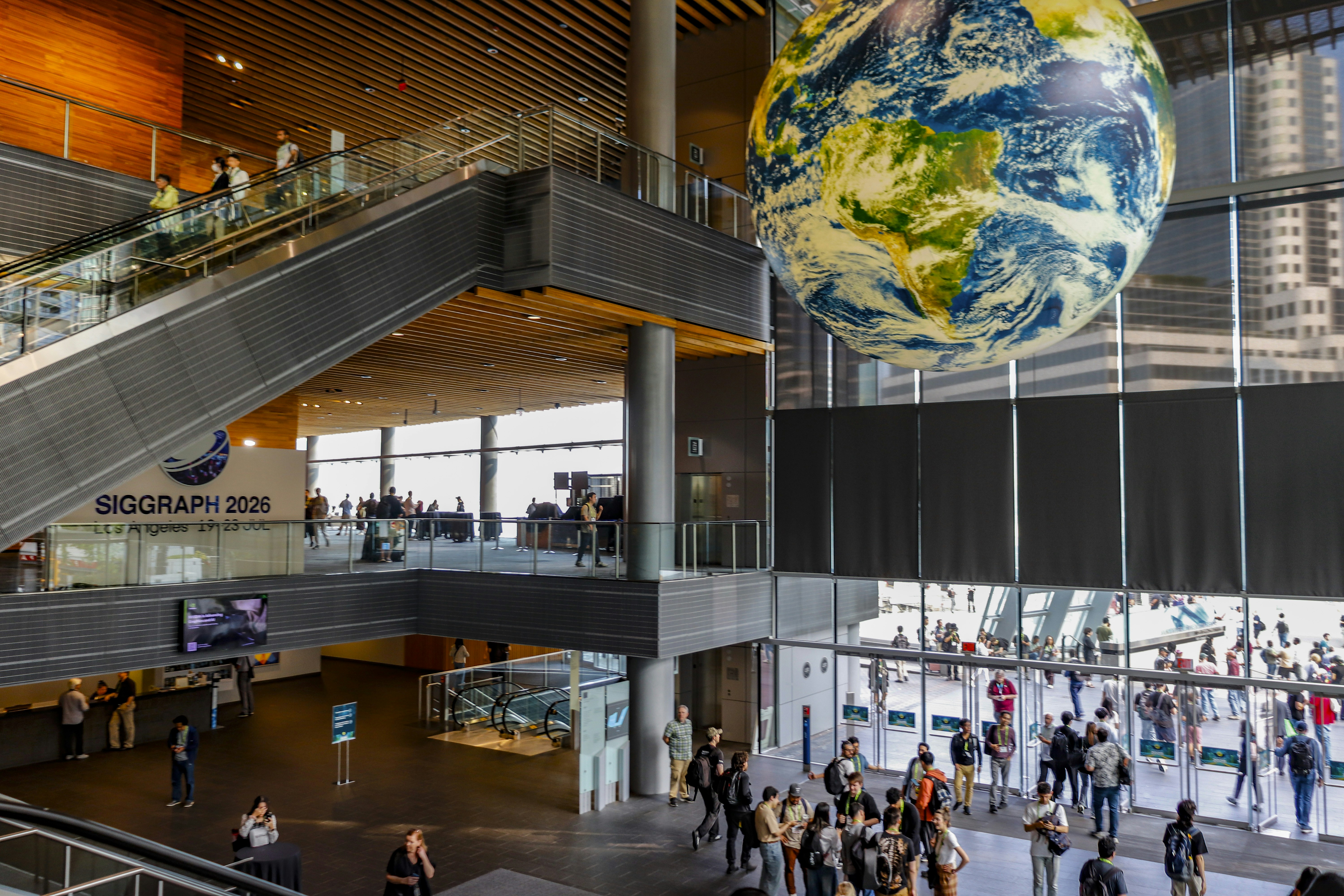 Canada Vancouver Convention Centre Lobby with huge overhead slowly spinning globe. | Modern building interior with large abstract sculpture hanging