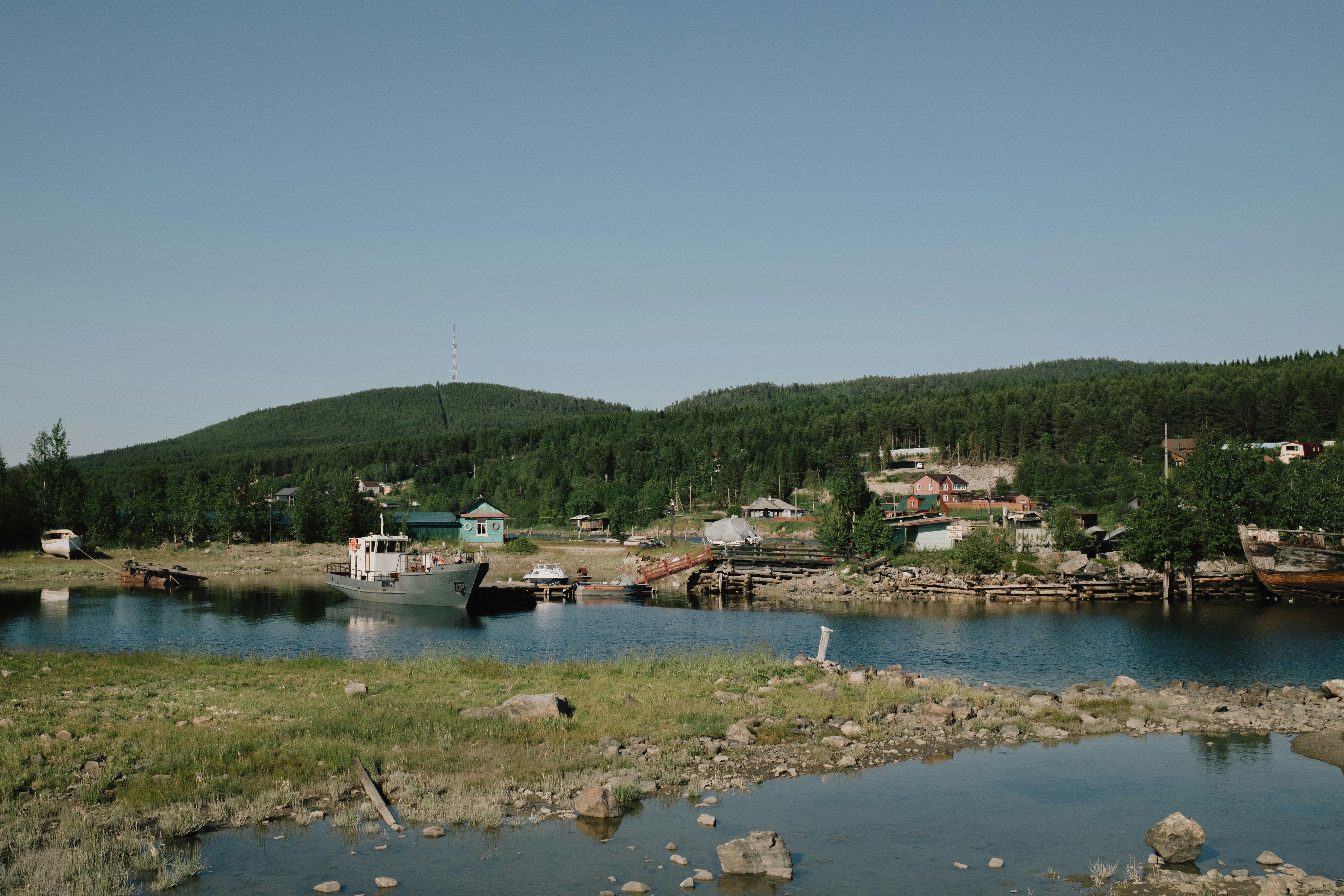 Harbor Village Beneath a Gentle Blue Sky