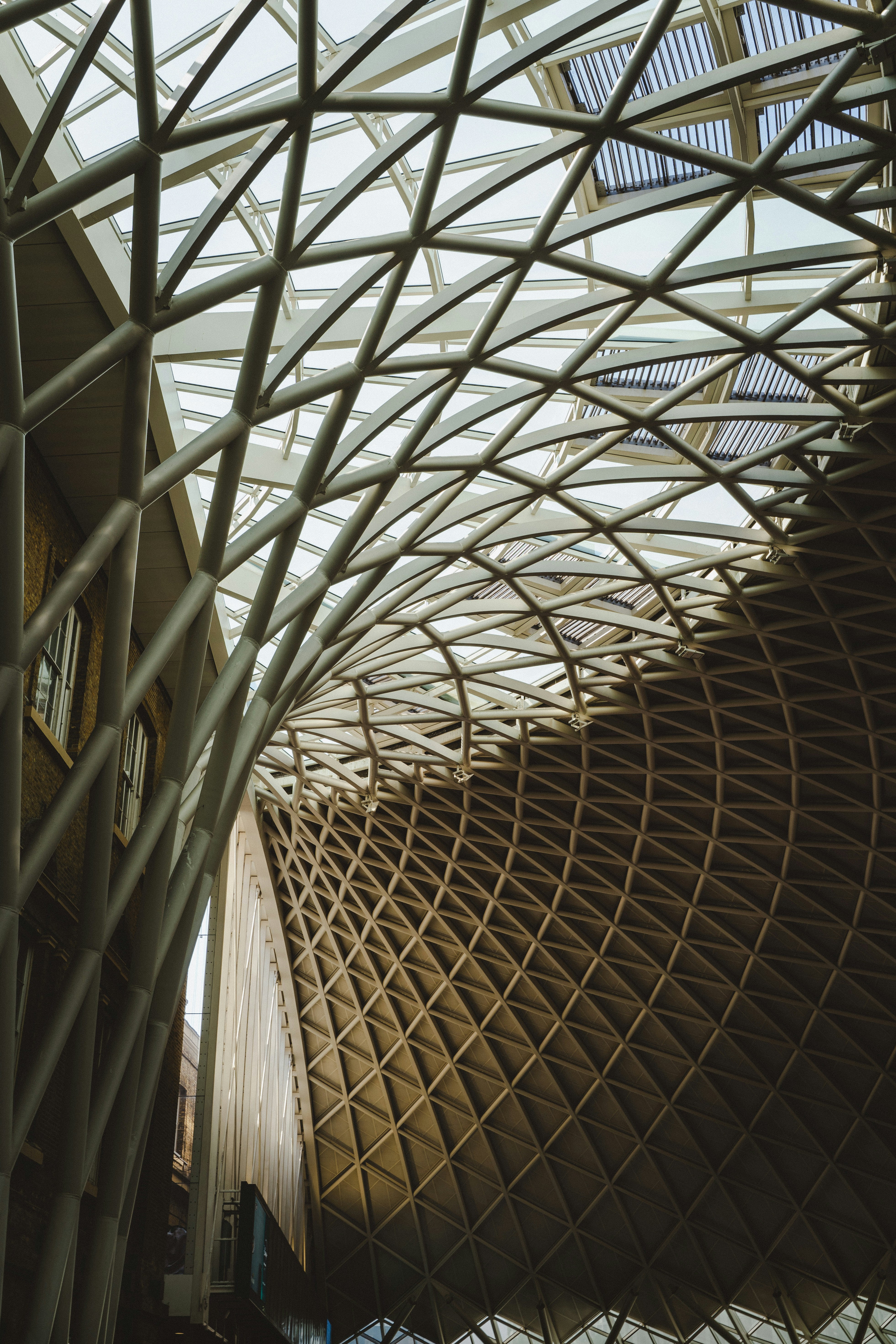 Modern geometric ceiling structure with natural light