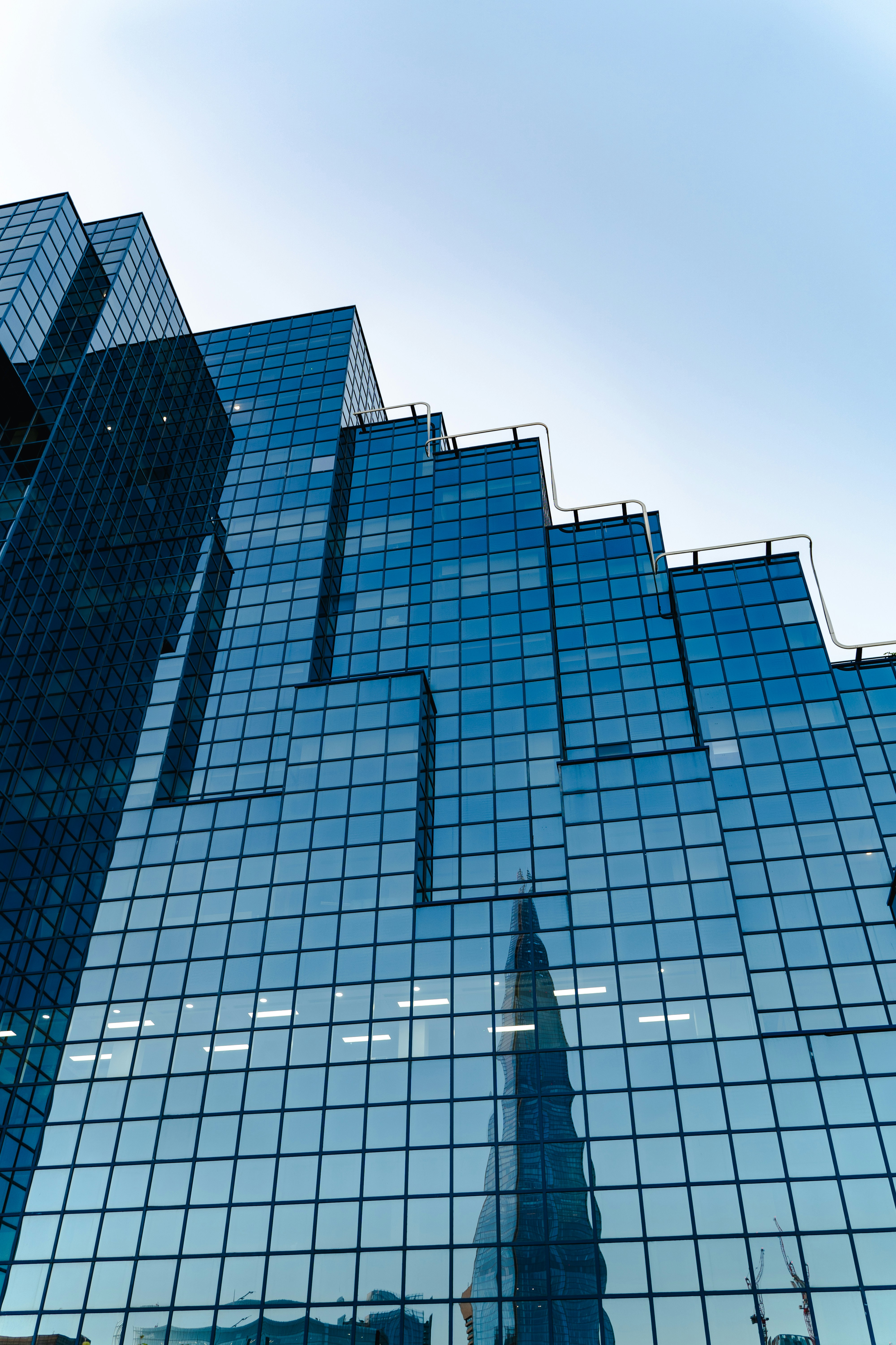 Modern glass skyscraper with reflective facade
