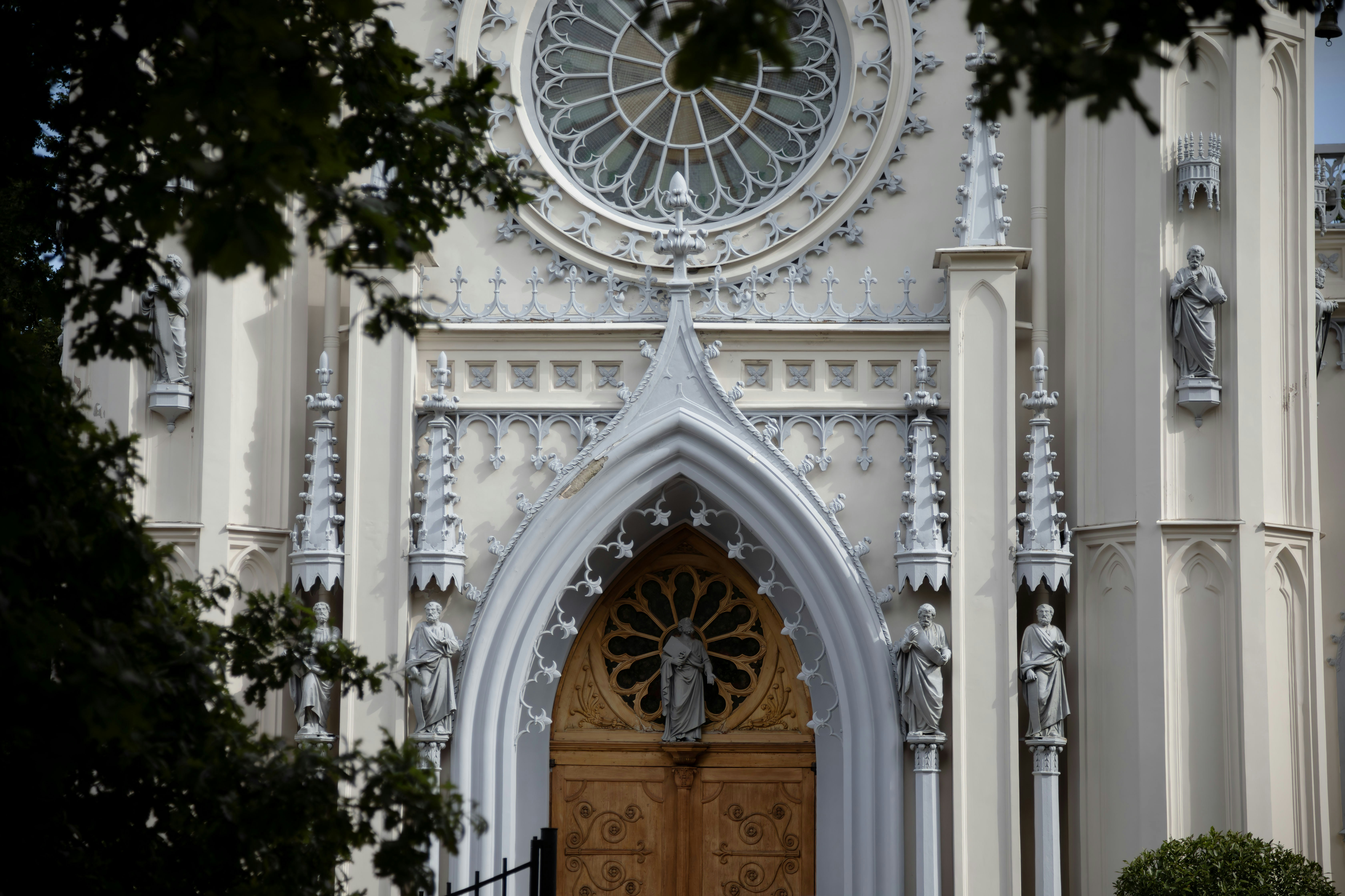 Chapel, Peterhof | Ornate gothic church entrance with rose window