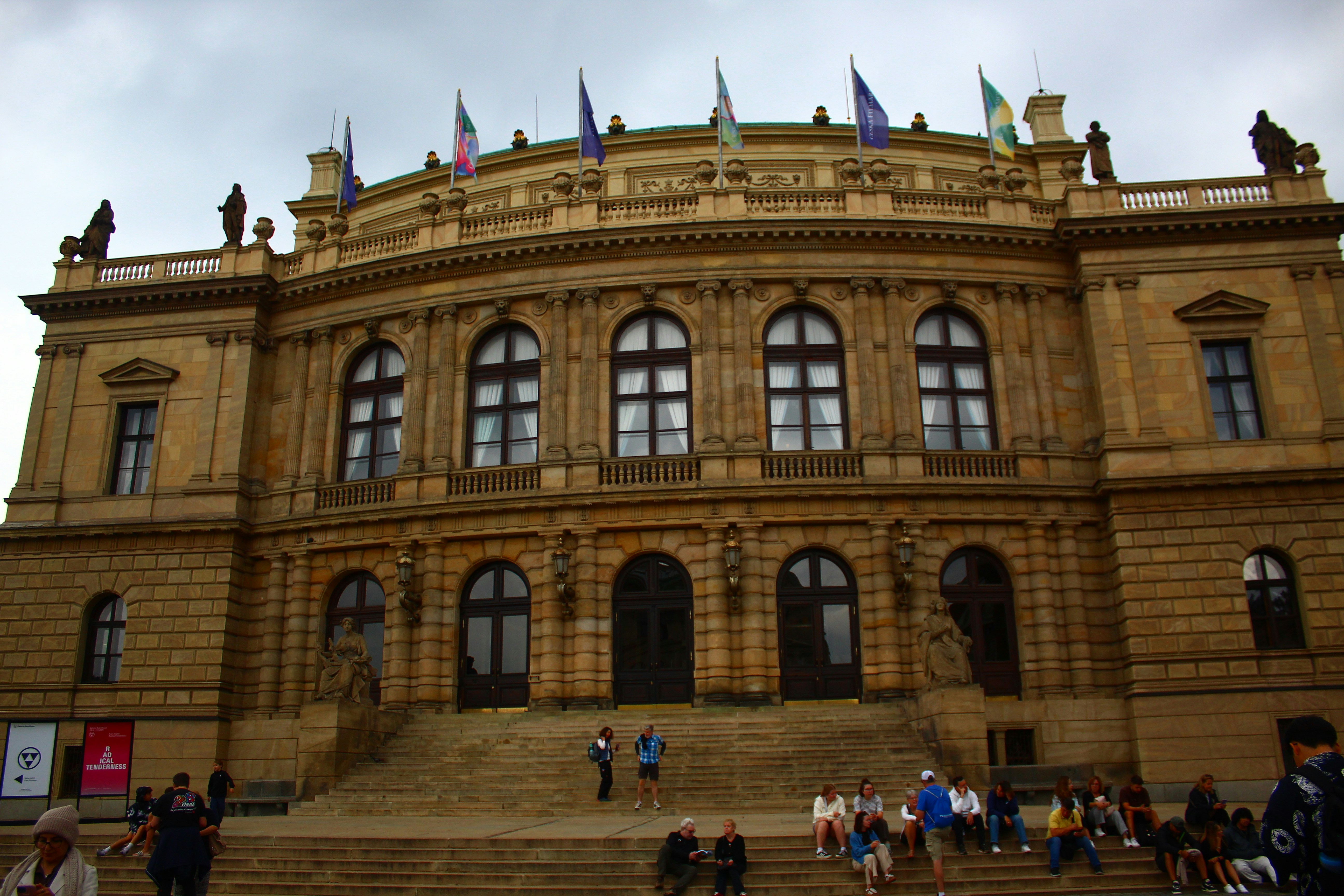 Grand building with ornate facade and flags photo – Free City Image on ...