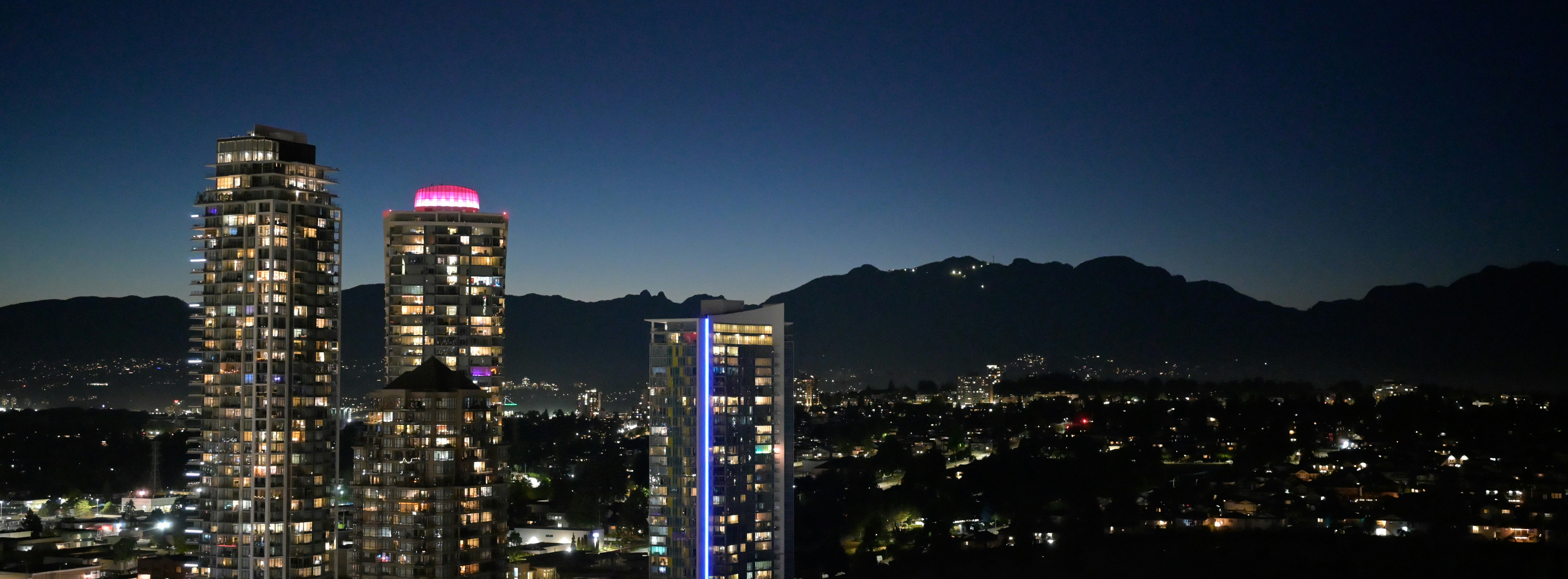 Night Skyline Pulse: City Towers Against a Velvet Sky