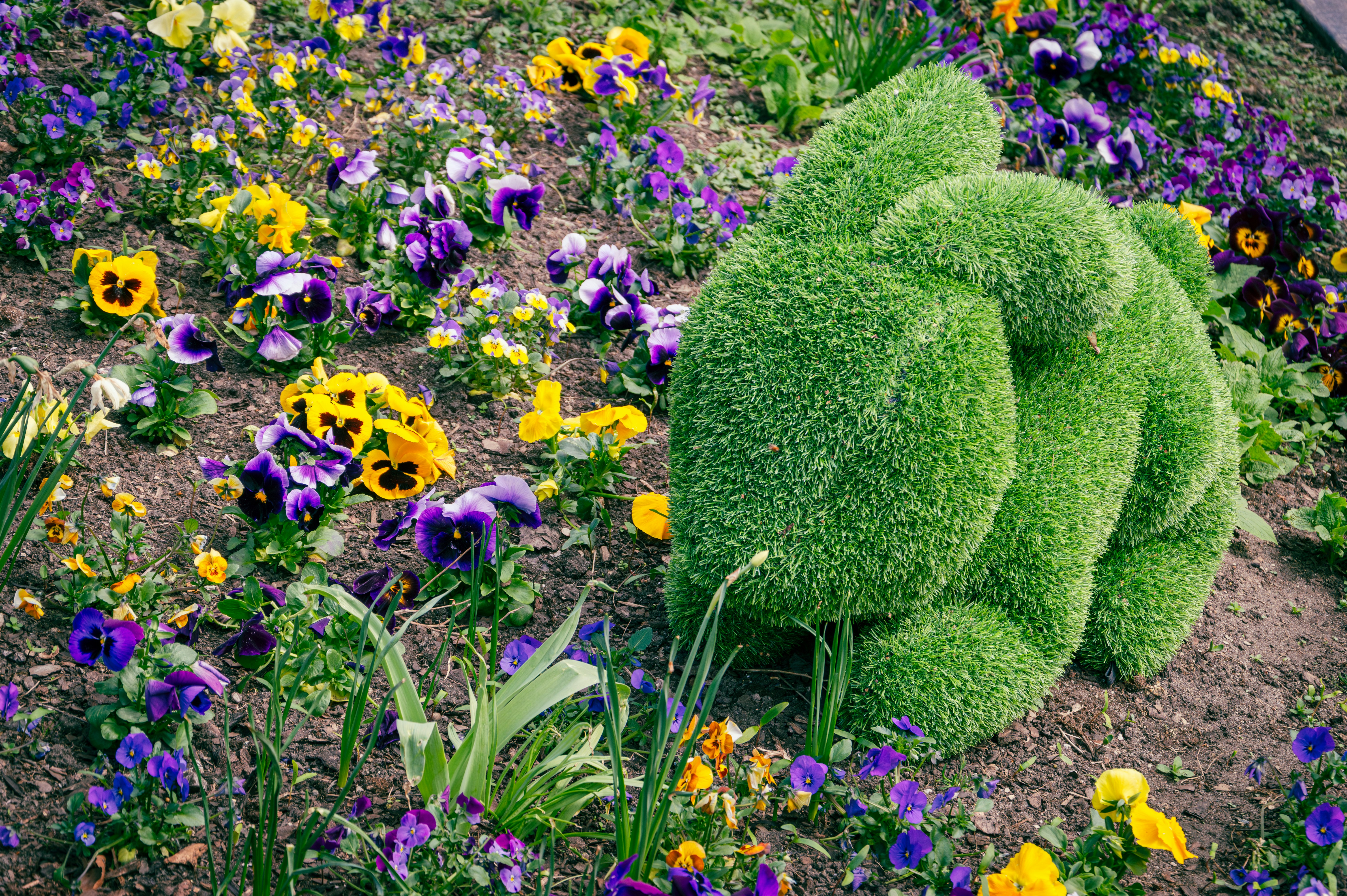 Whimsical Greenery: A Bunny's Floral Retreat