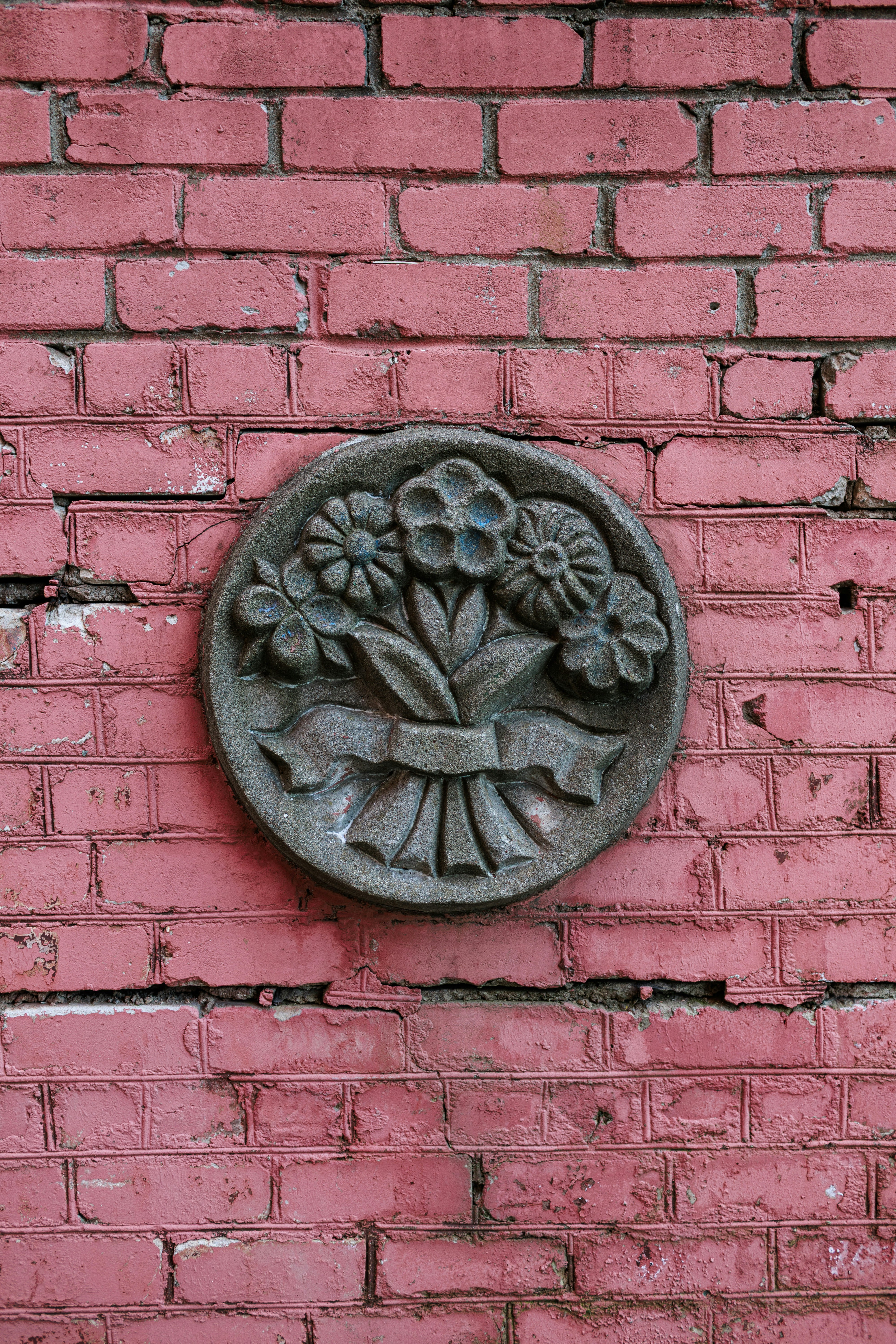 Floral Emblem on a Weathered Canvas
