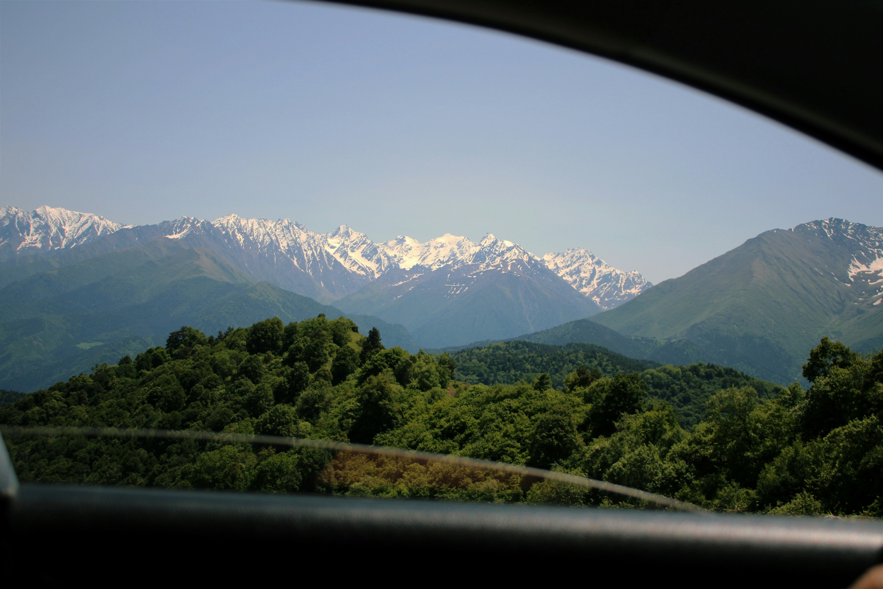 Majestic Peaks Beyond the Glass