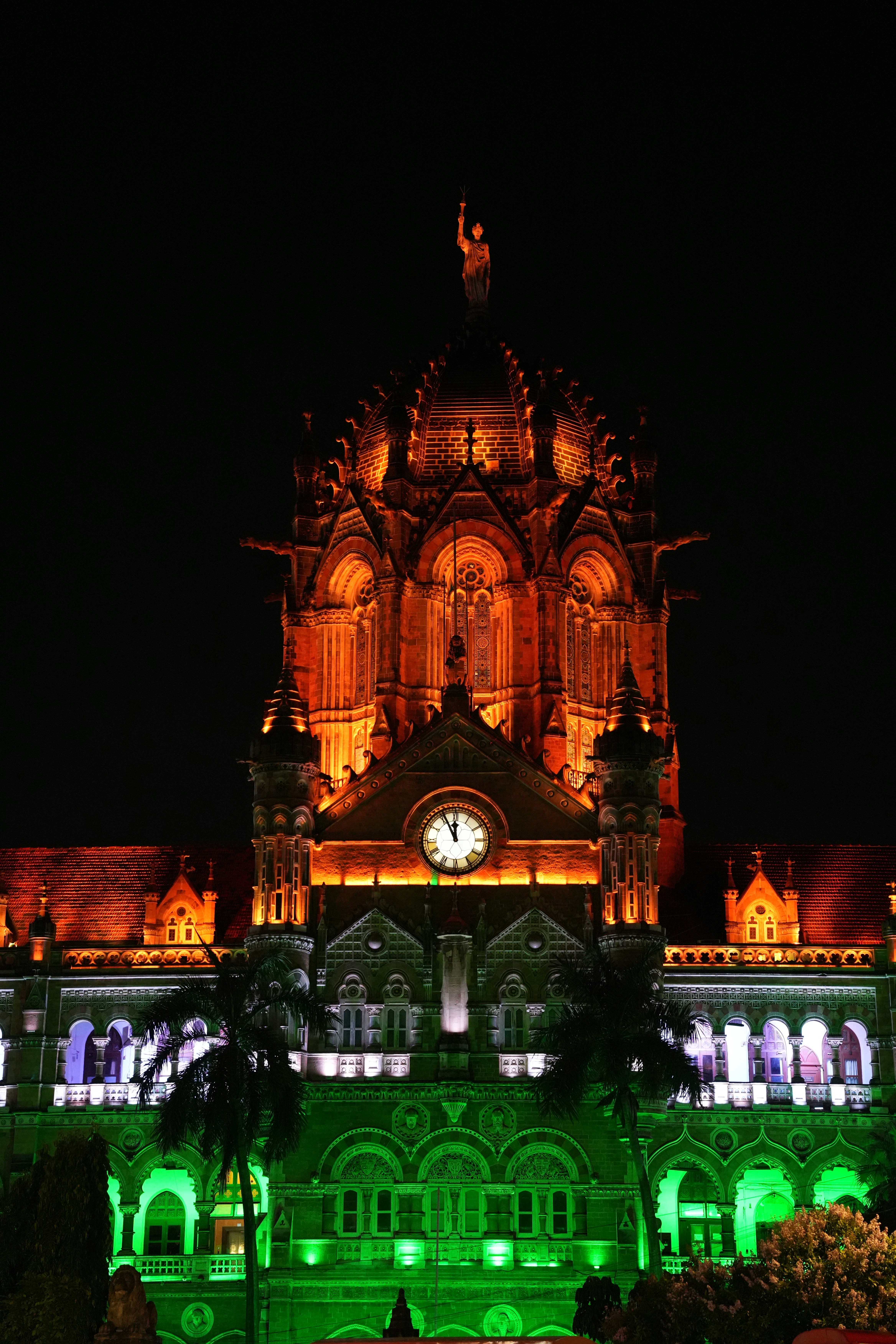 Historic building illuminated with indian flag colors at night