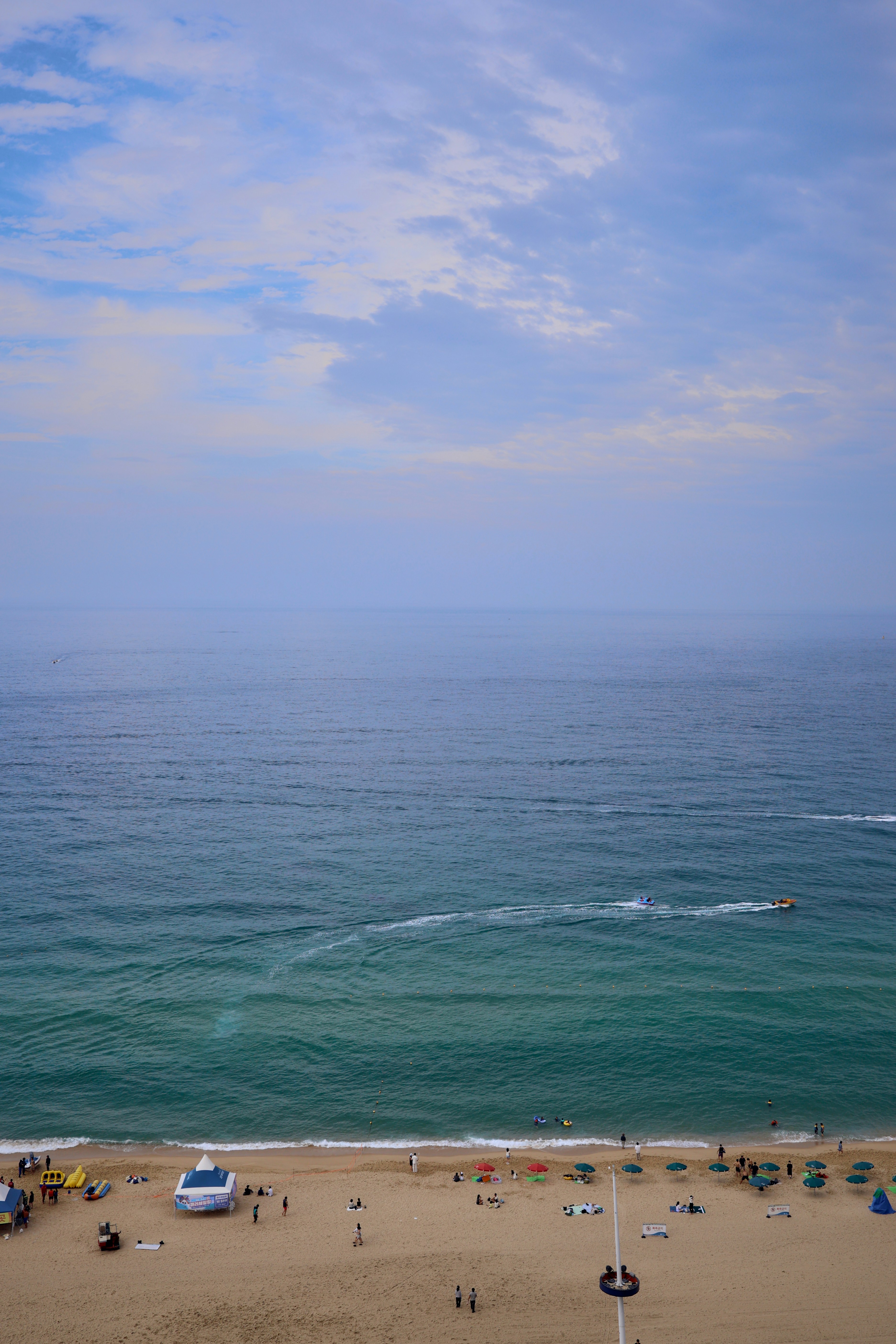 Serene Coastal Horizon: A Day at the Beach
