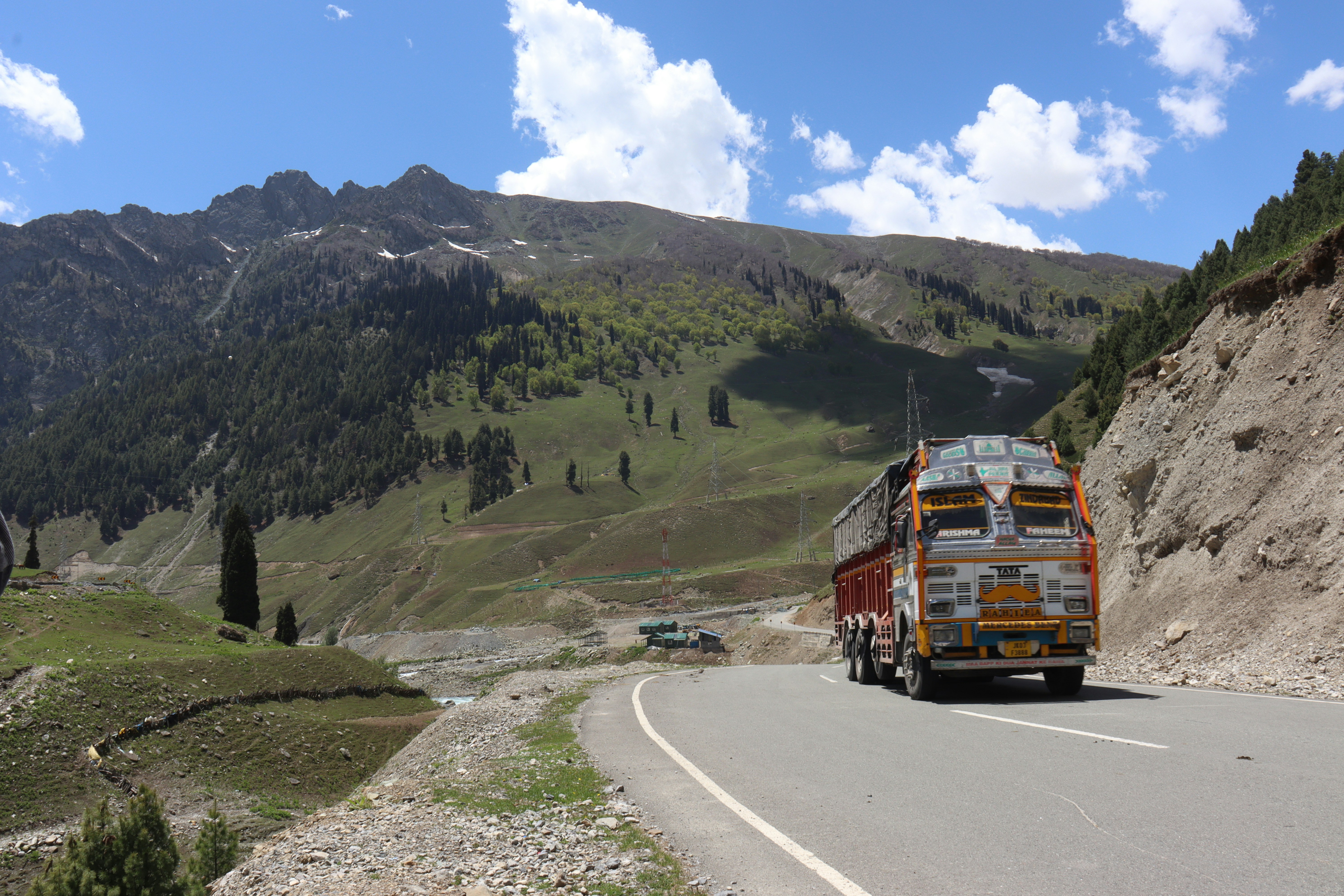 Alpine Ridge Freight: A Freight Truck Rounds a Mountain Bend