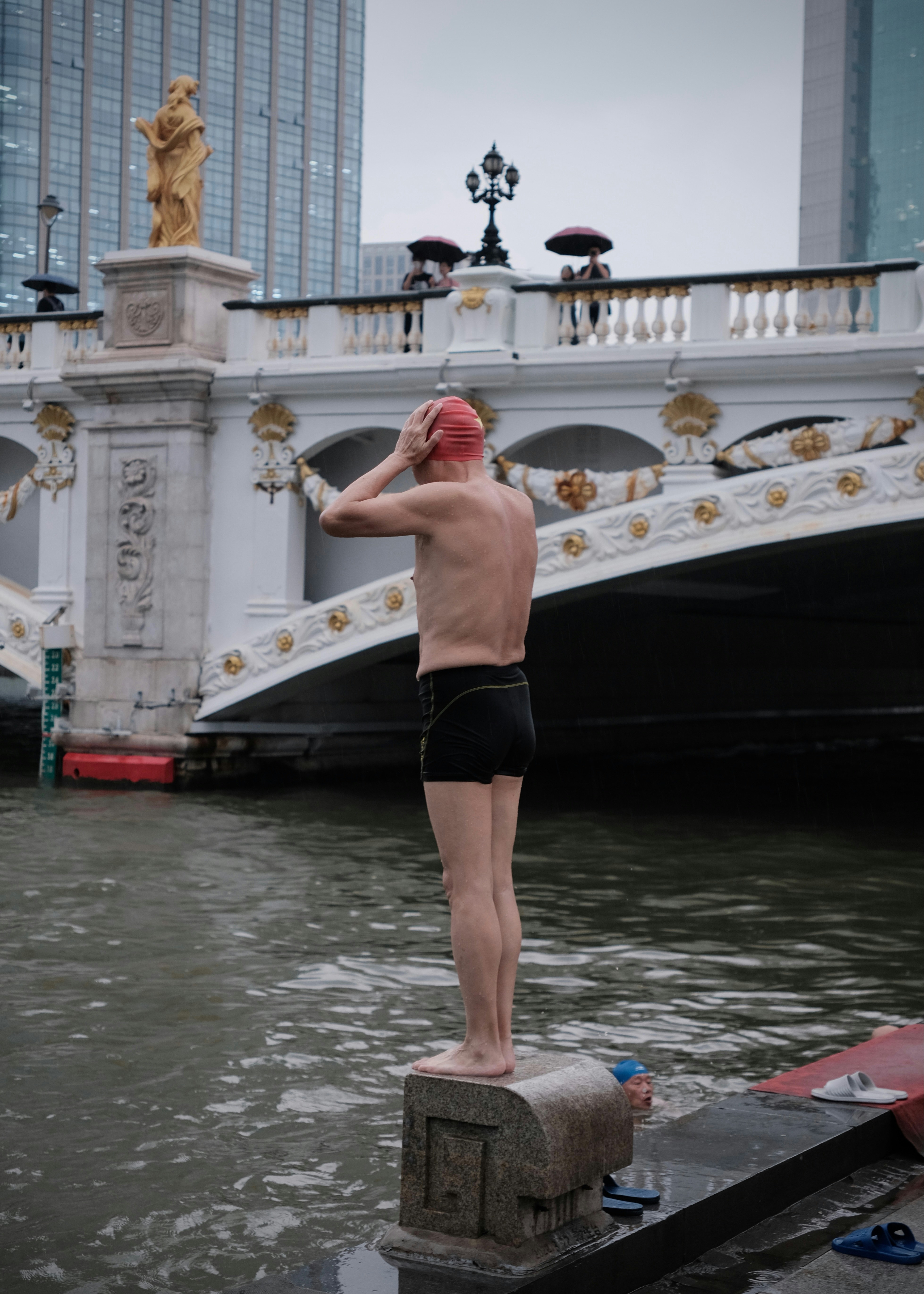 Balancing on Stone: A Silhouette by the Pont