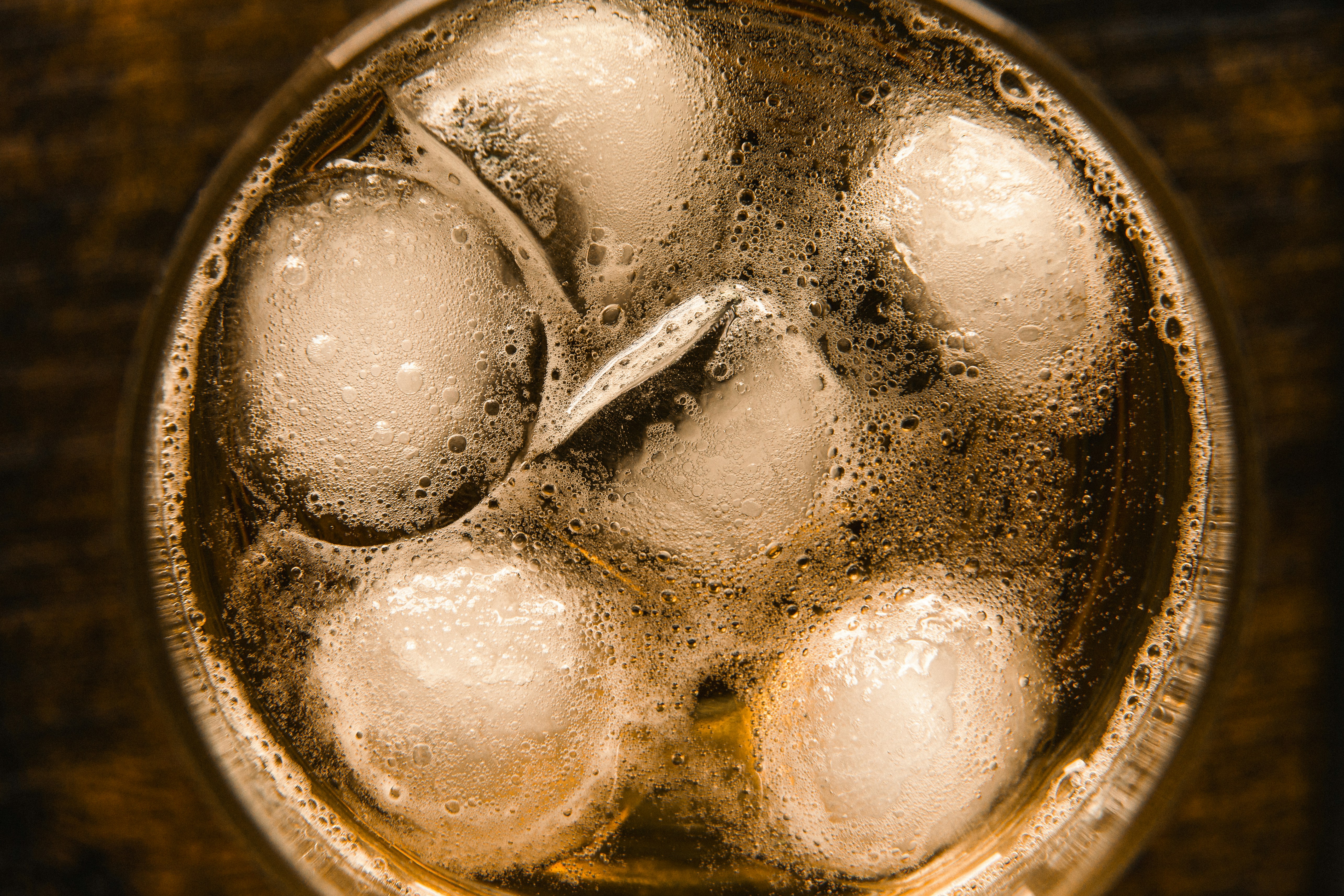 Loved capturing this moment 📸. If you enjoy minimal photography, check out my guide here: https://quietminimalism.etsy.com/listing/4347811015 | Close-up of ice cubes in a beverage