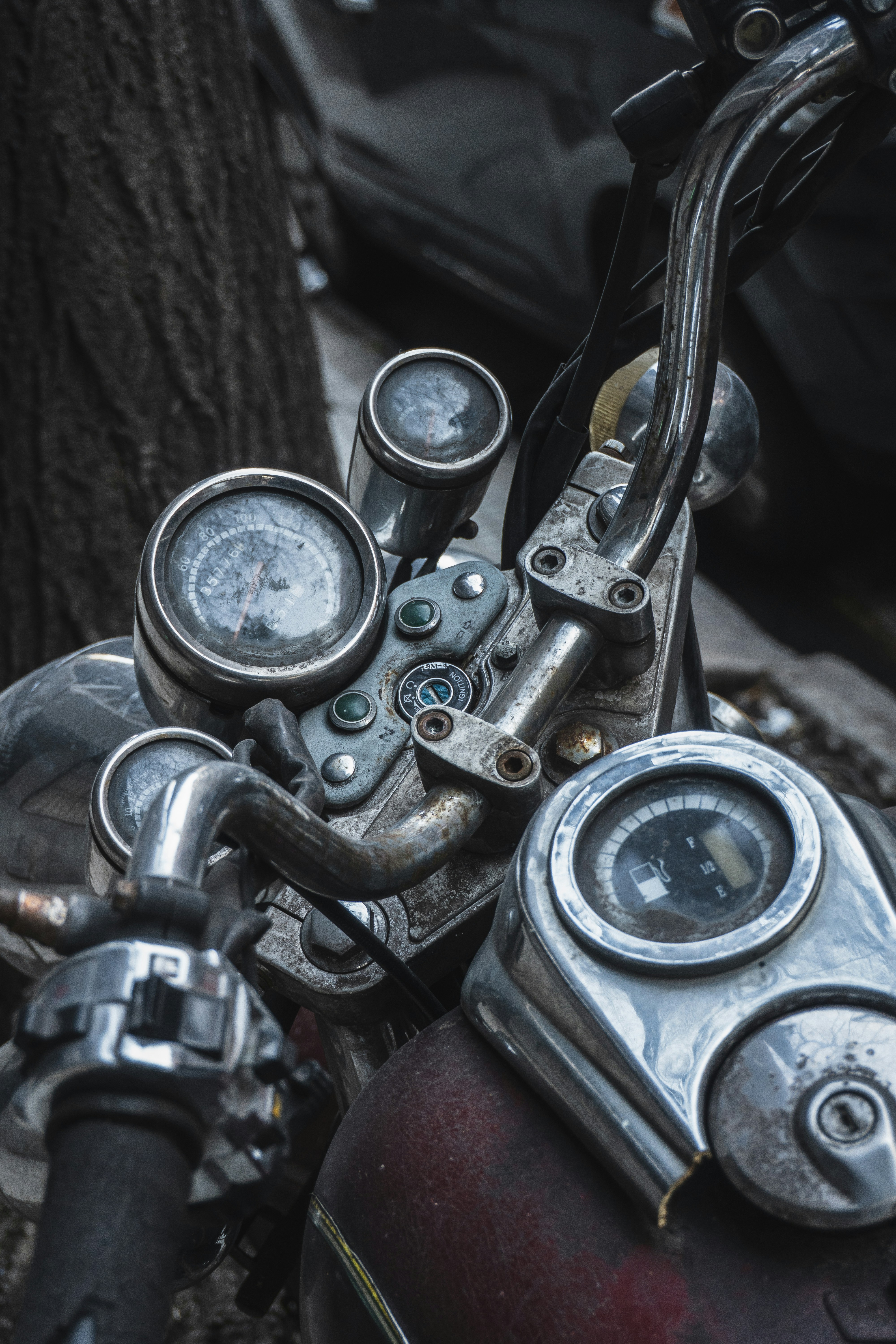 Close-up view of a vintage motorcycle dashboard