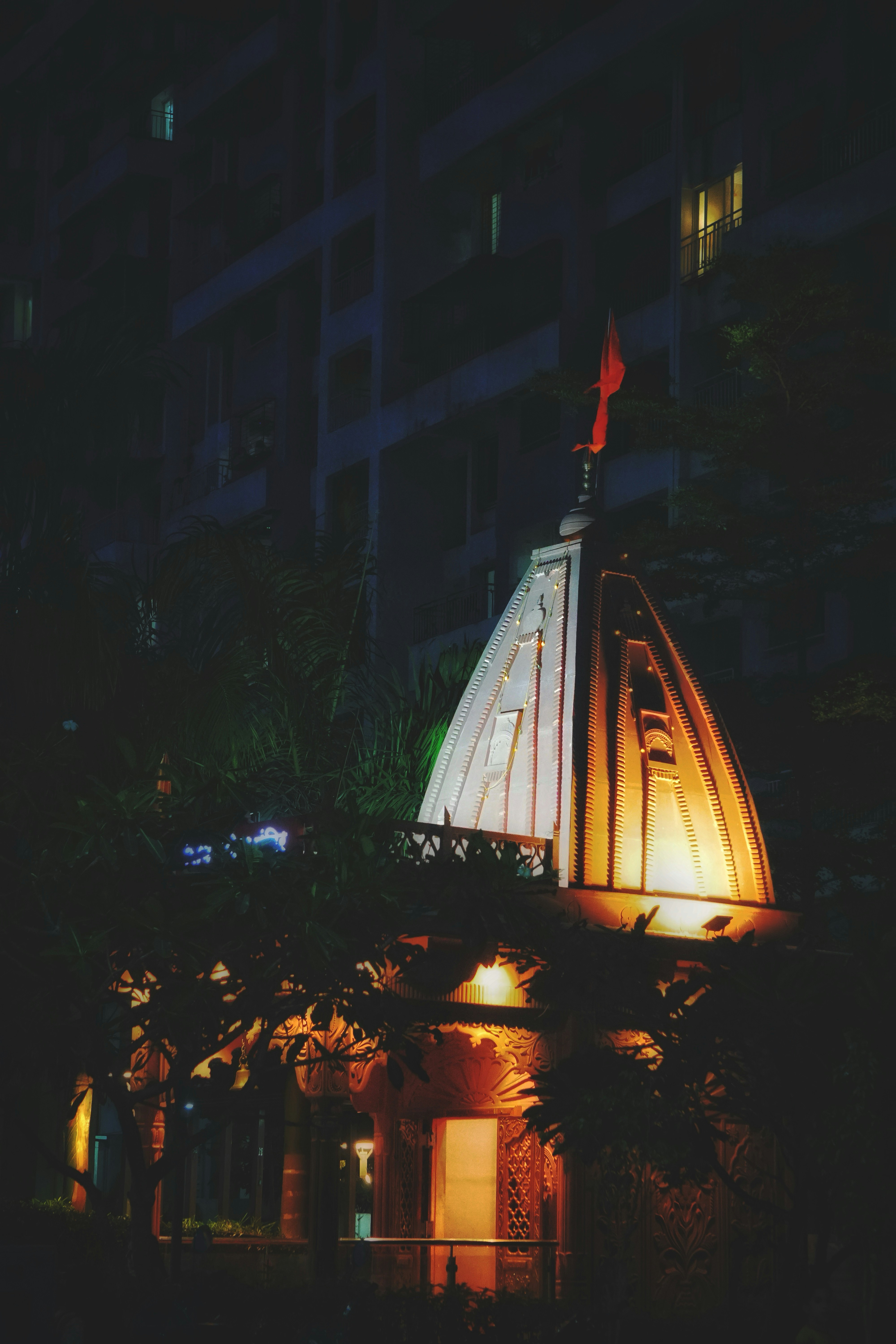 Illuminated Sanctuary Amidst Urban Shadows