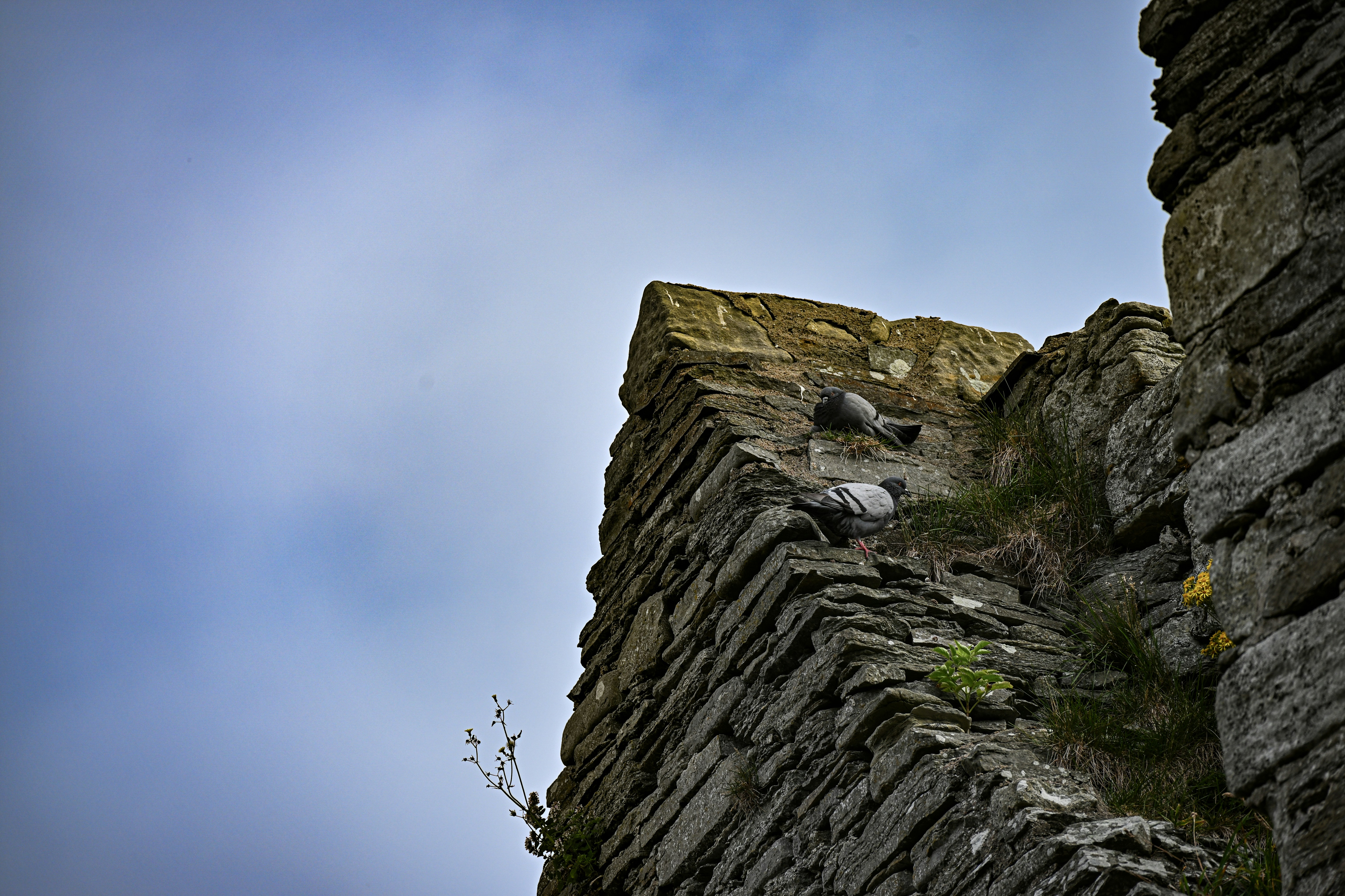 Stone ruins against a cloudy sky