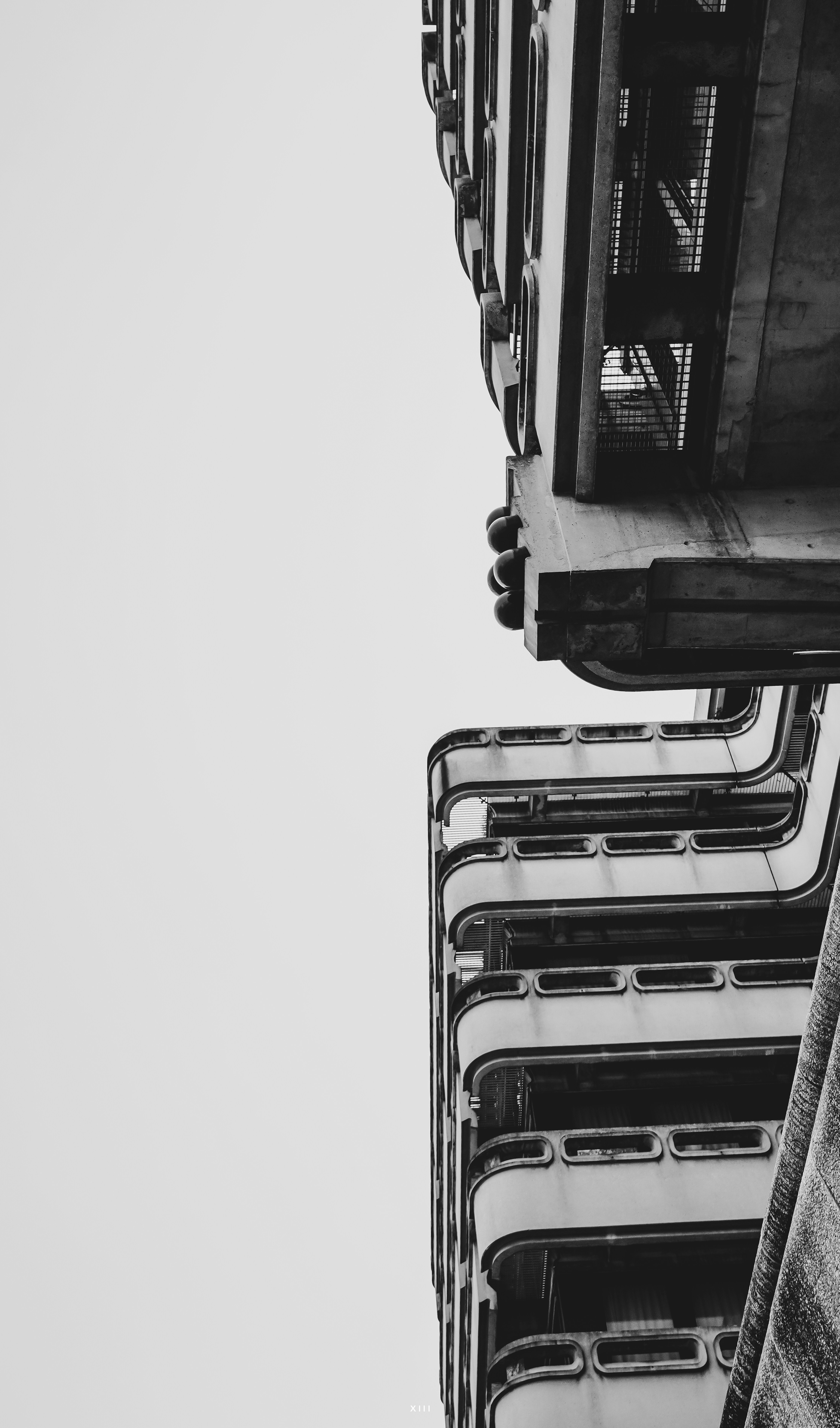 Abstract view of modern building balconies against sky