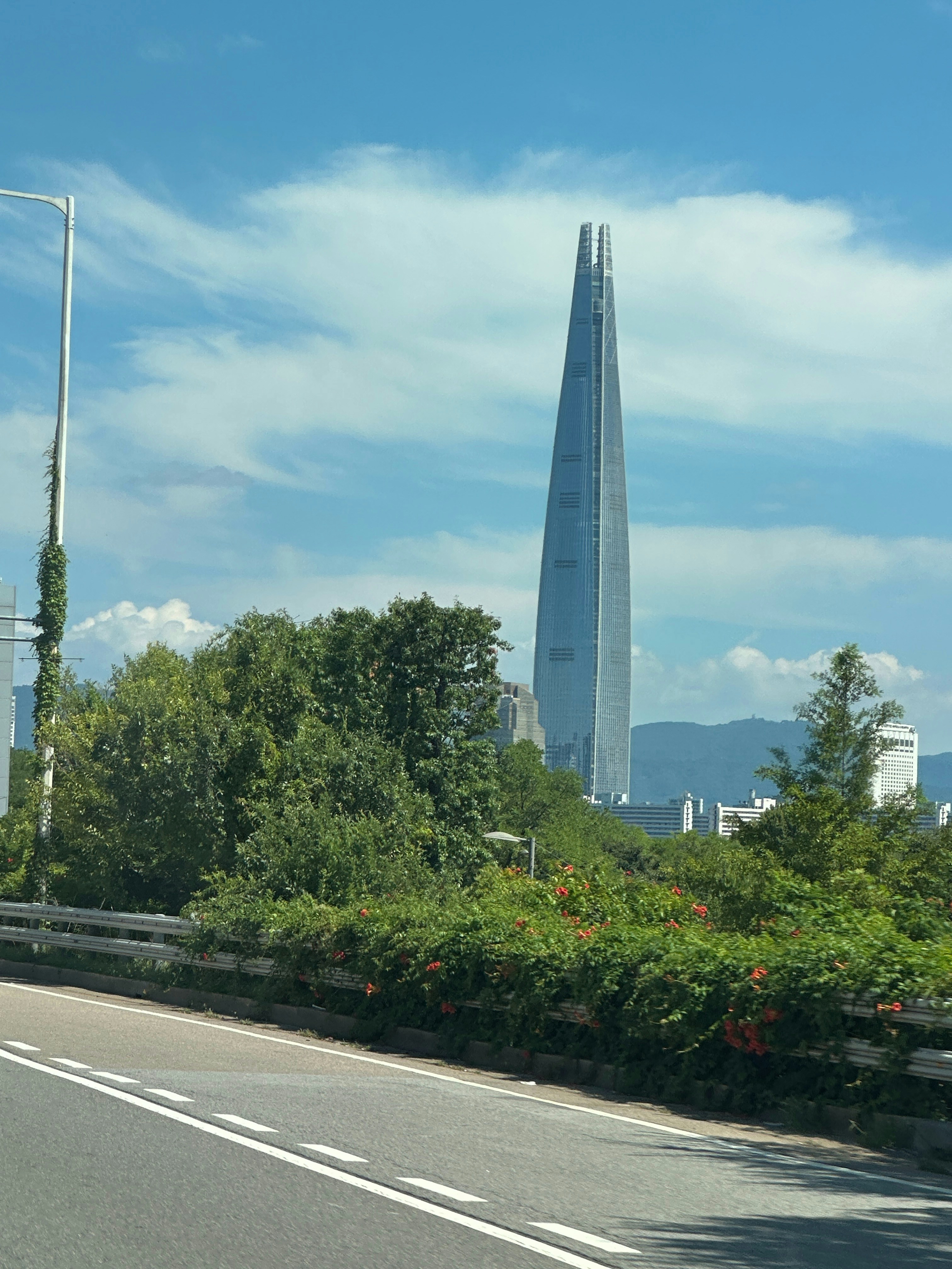 Skyward Ascent: The Iconic Tower Against a Blue Canvas
