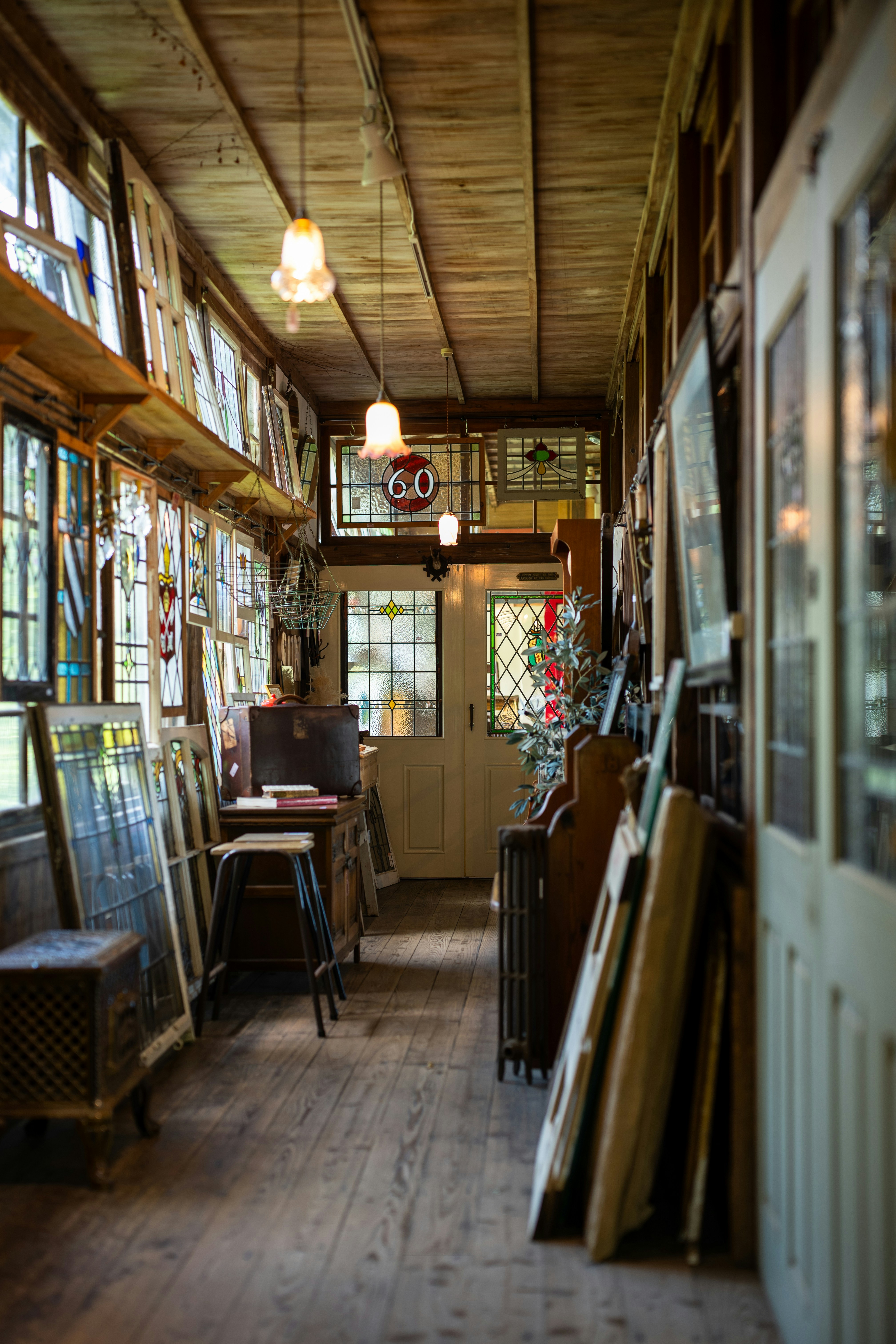 Antique shop hallway filled with various items