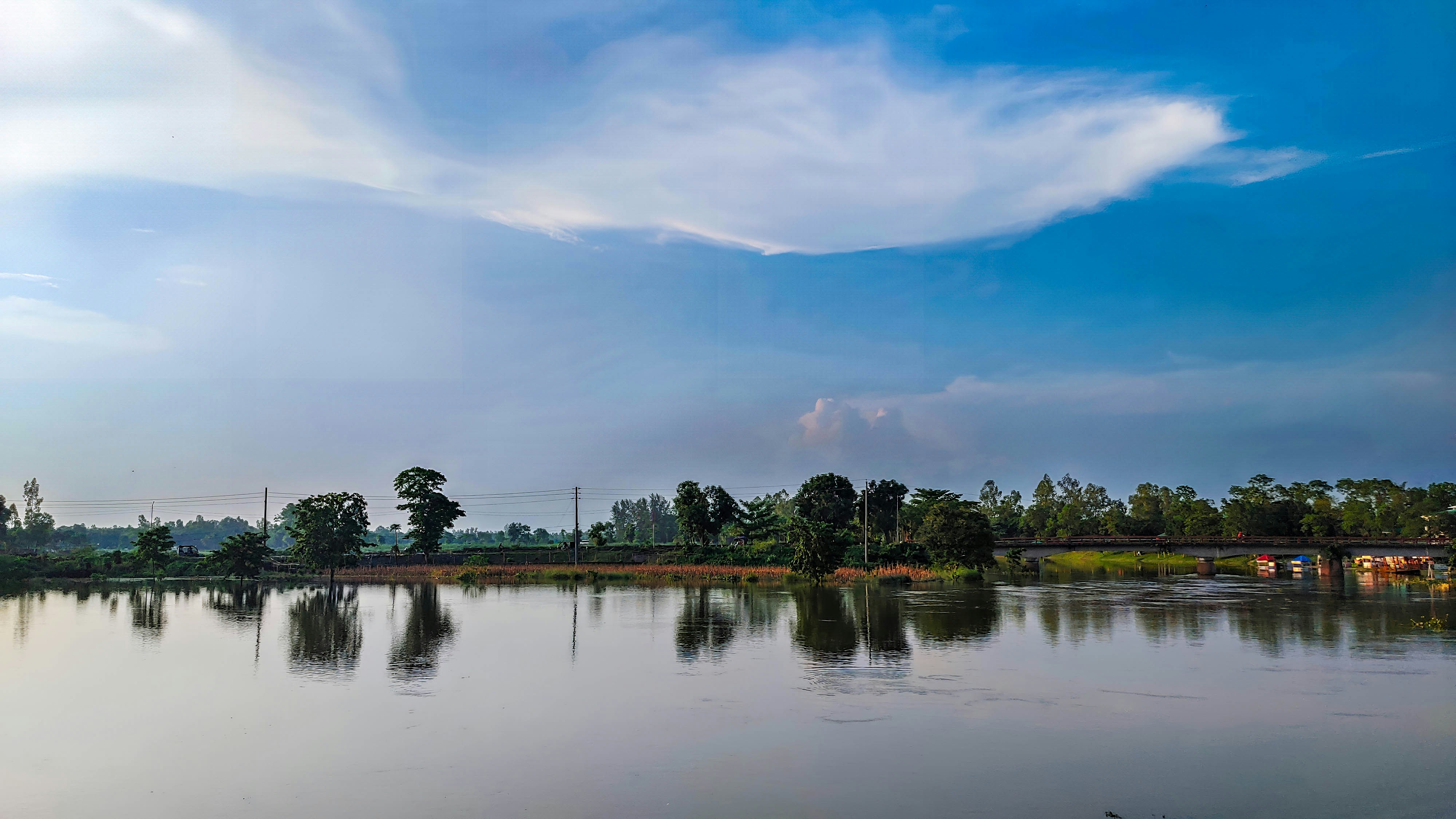 Wide Sky Reflections on the Ghagot River Bank, Rangpur