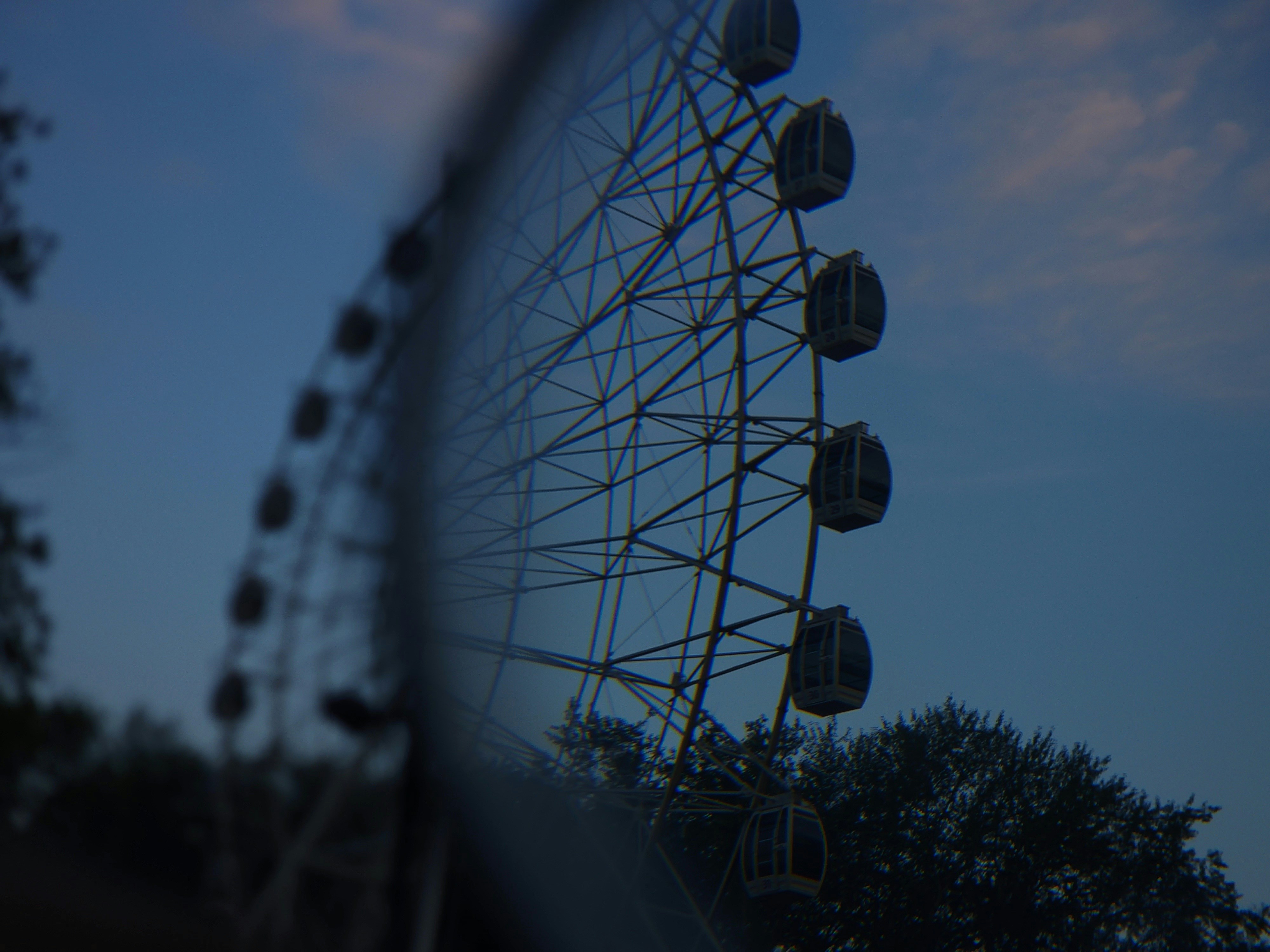 Whispers of the Ferris Wheel at Dusk