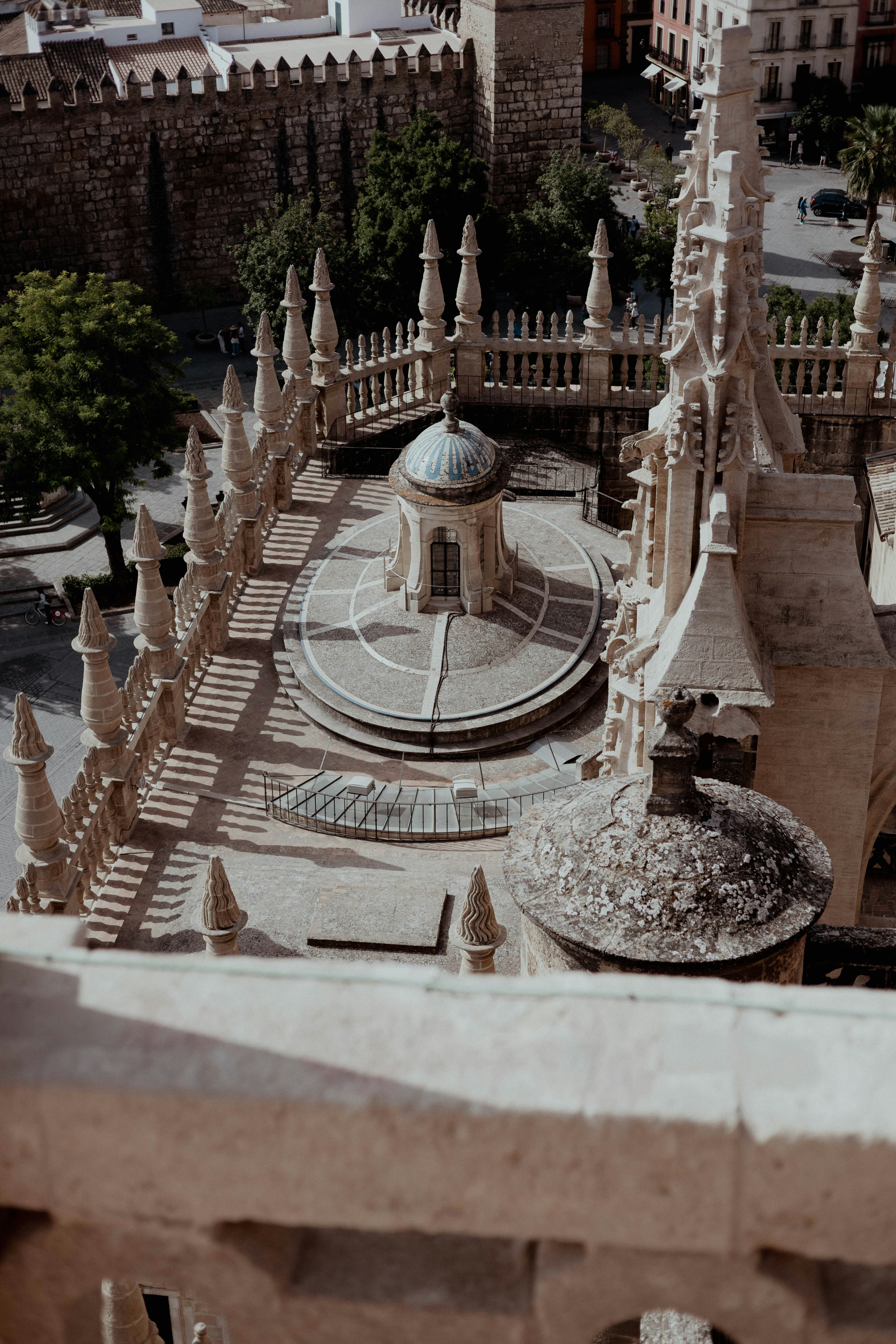 Ornate gothic cathedral rooftop with intricate spires and domes. photo ...
