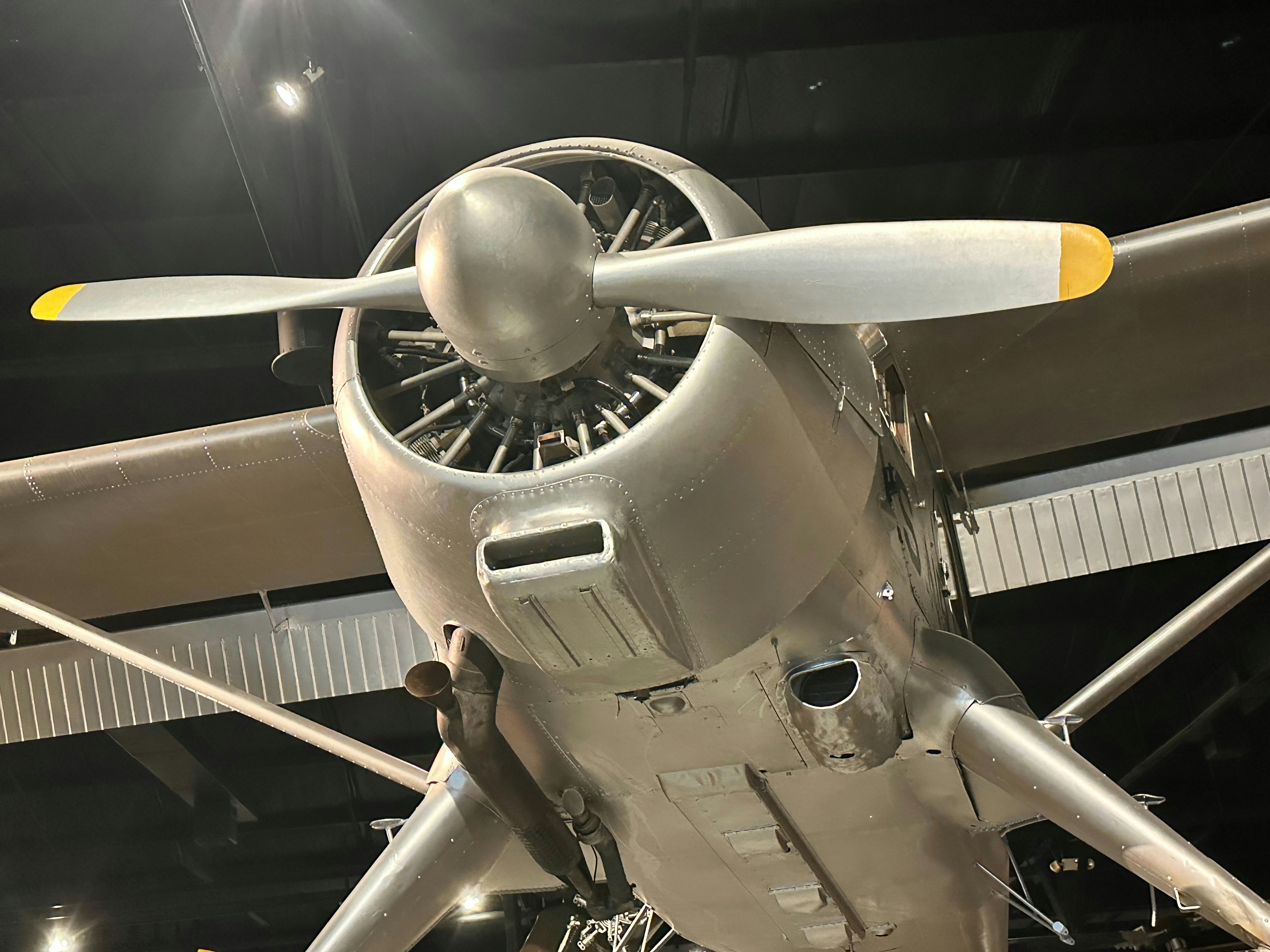 Close-up of a vintage airplane engine and propeller.
