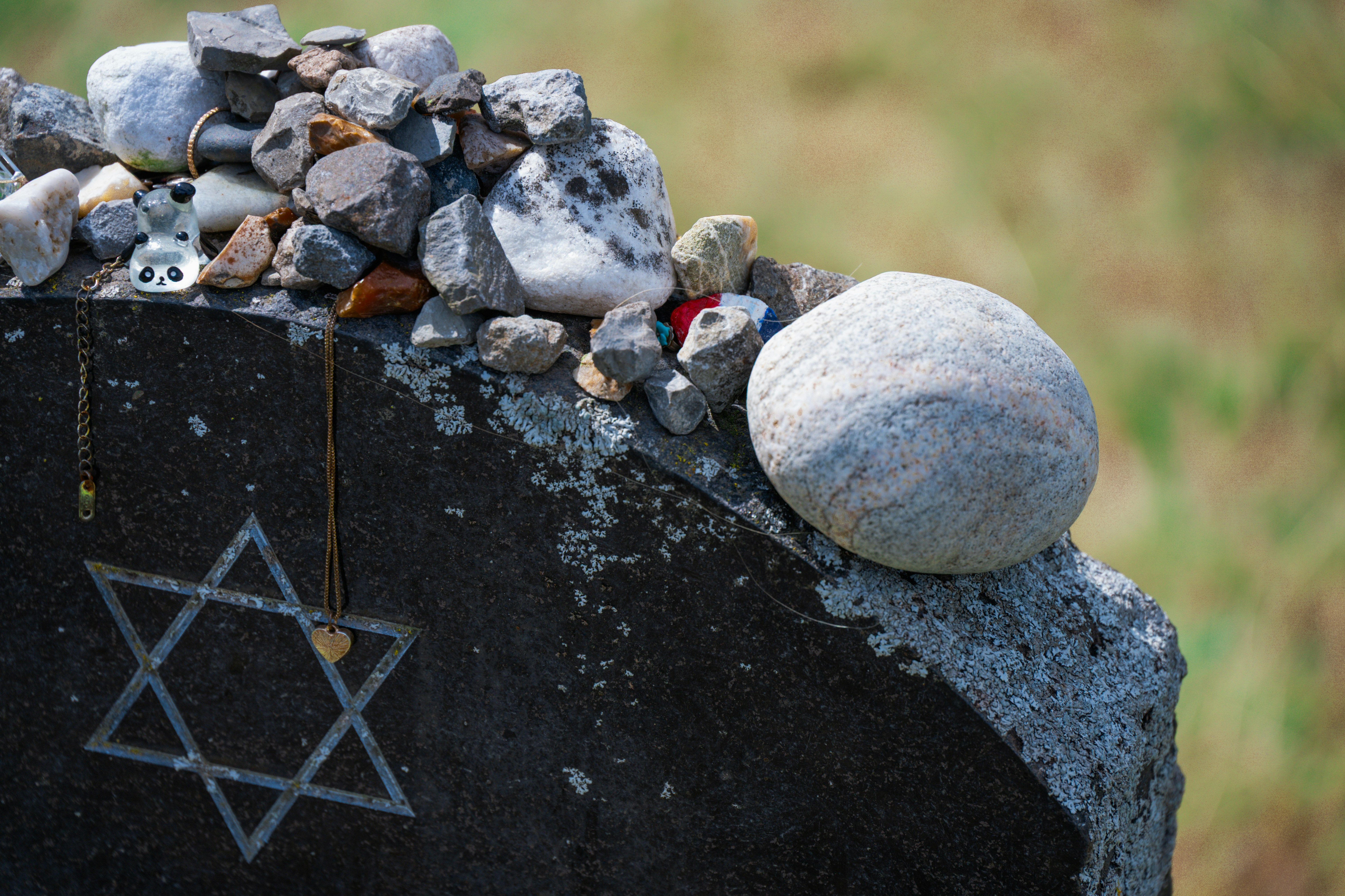 Weathered Stone Marker with Star of David, Crowned by a Pebble Crest