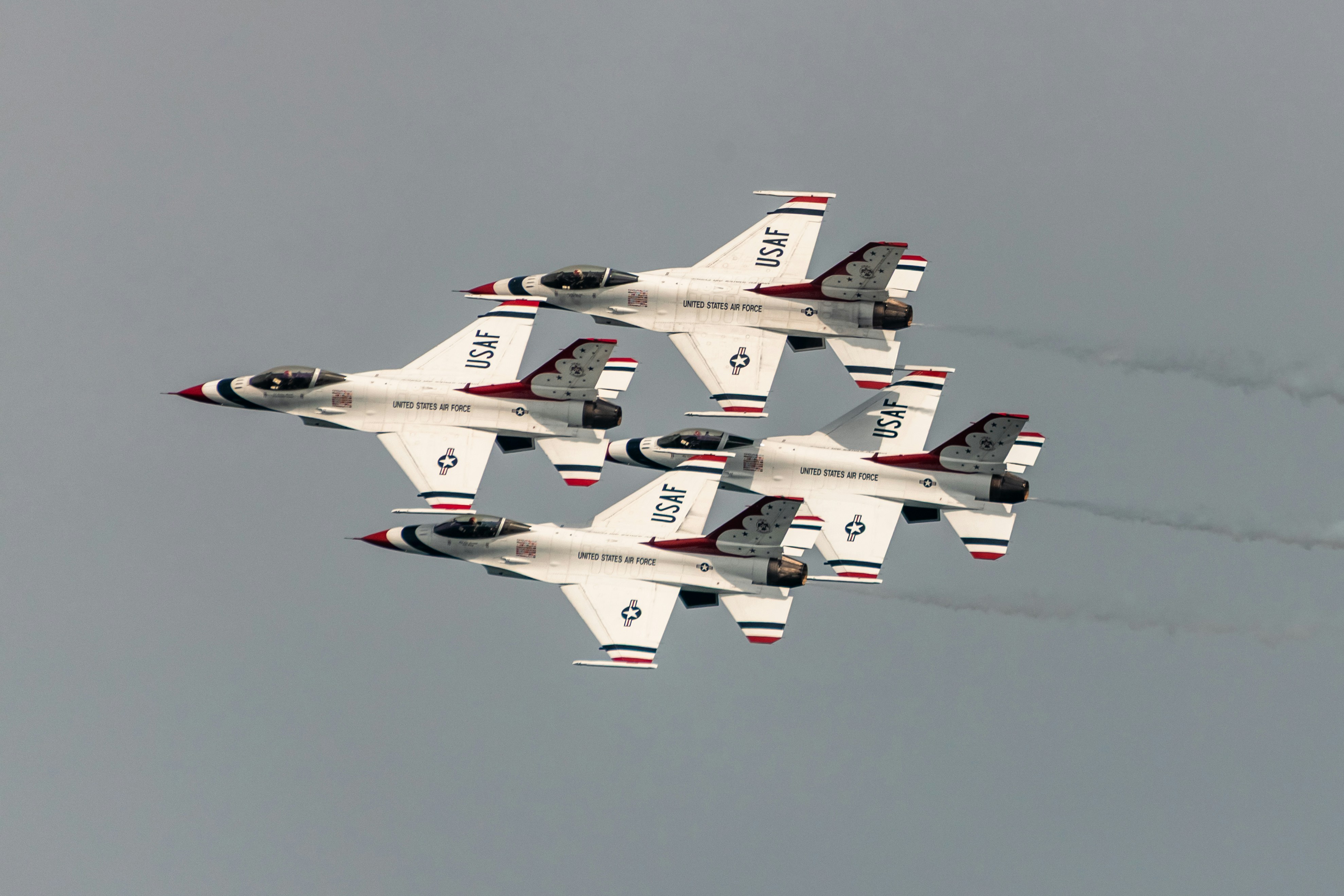 Six-Jet Delta: Precision Formation Slices Through a Slate Sky