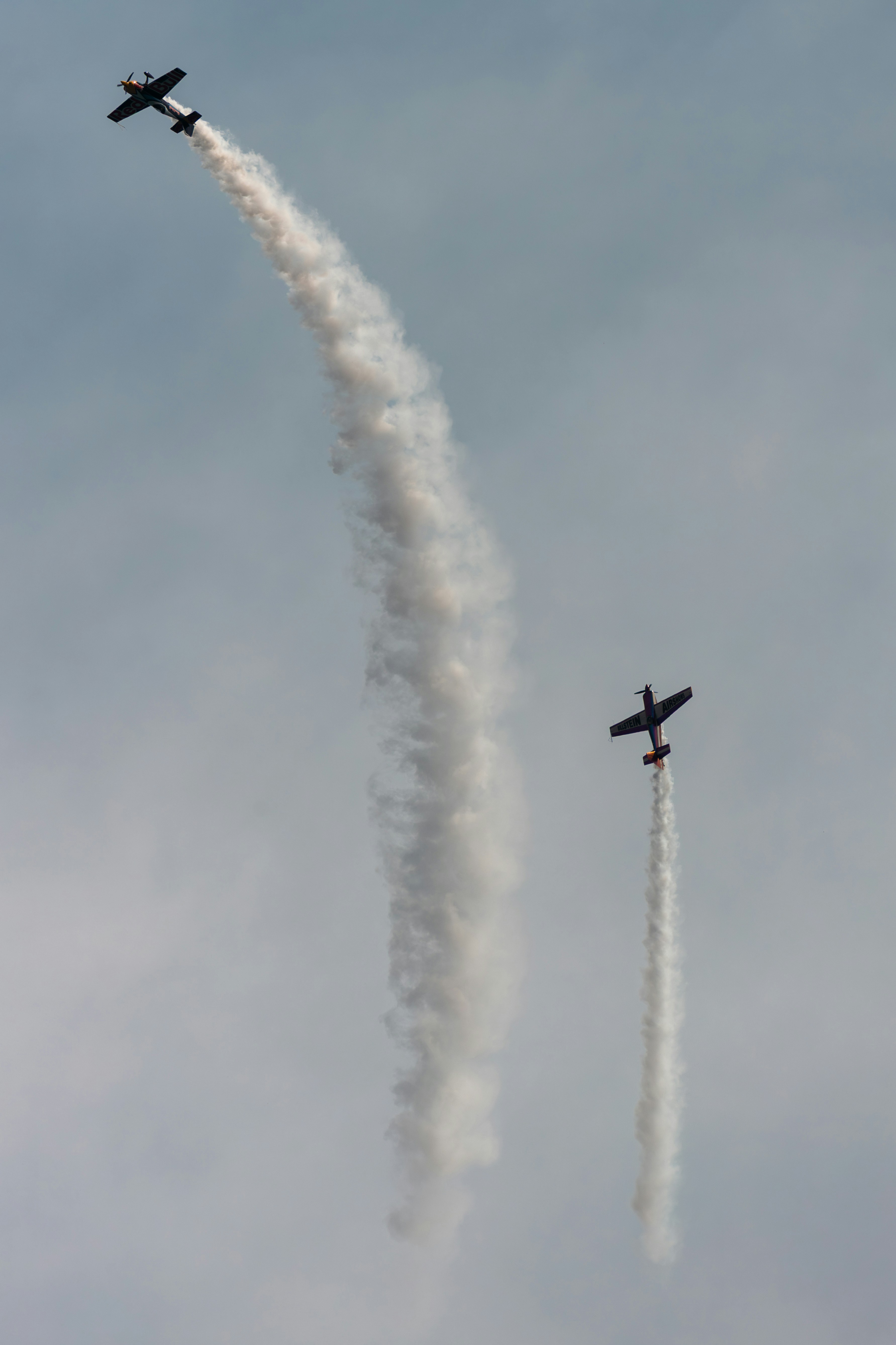 Two planes performing aerobatics at the Chicago Air and Water show 2025 | Two planes perform aerobatics with smoke trails